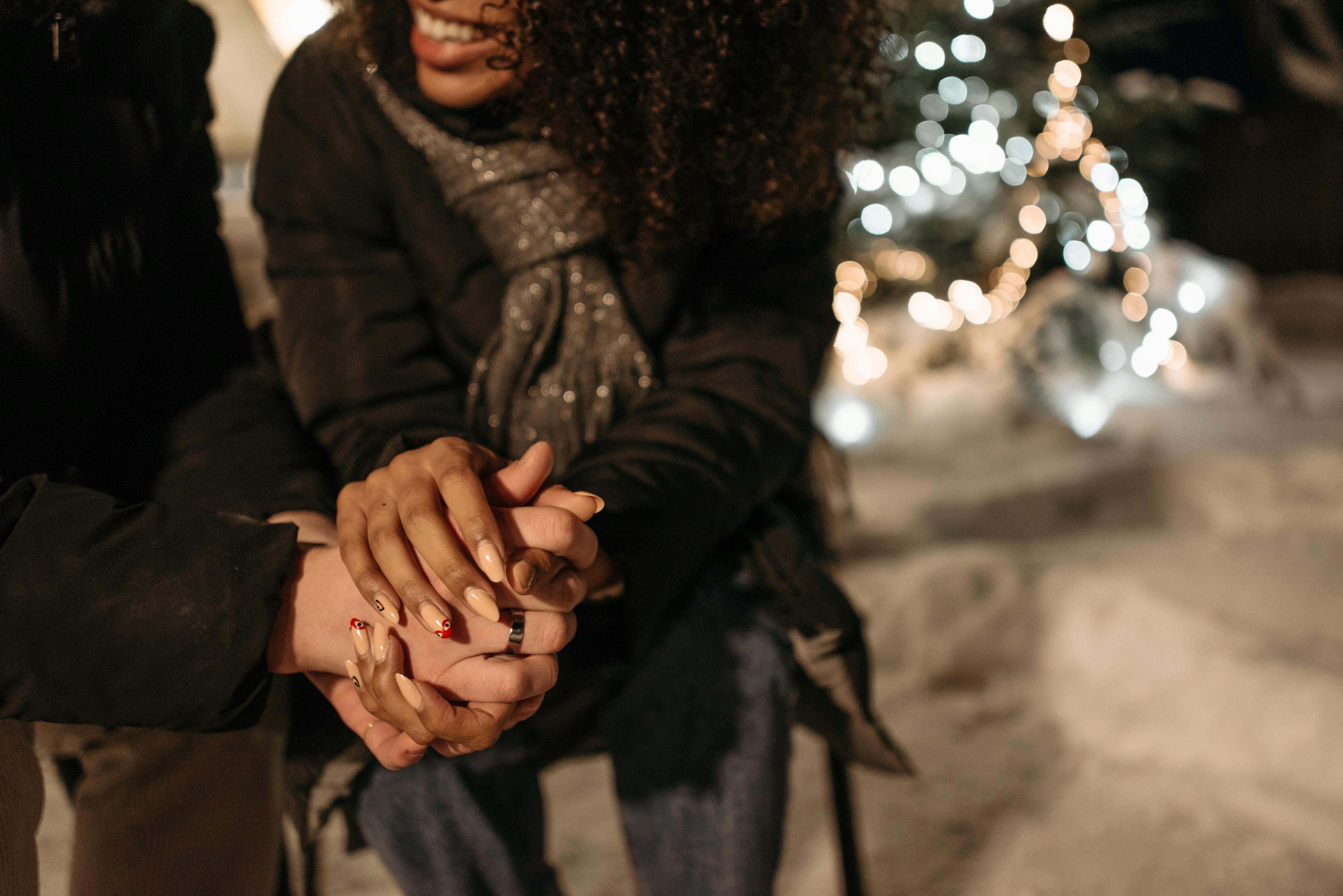 A Romantic Couple Holding Hands · Free Stock Photo