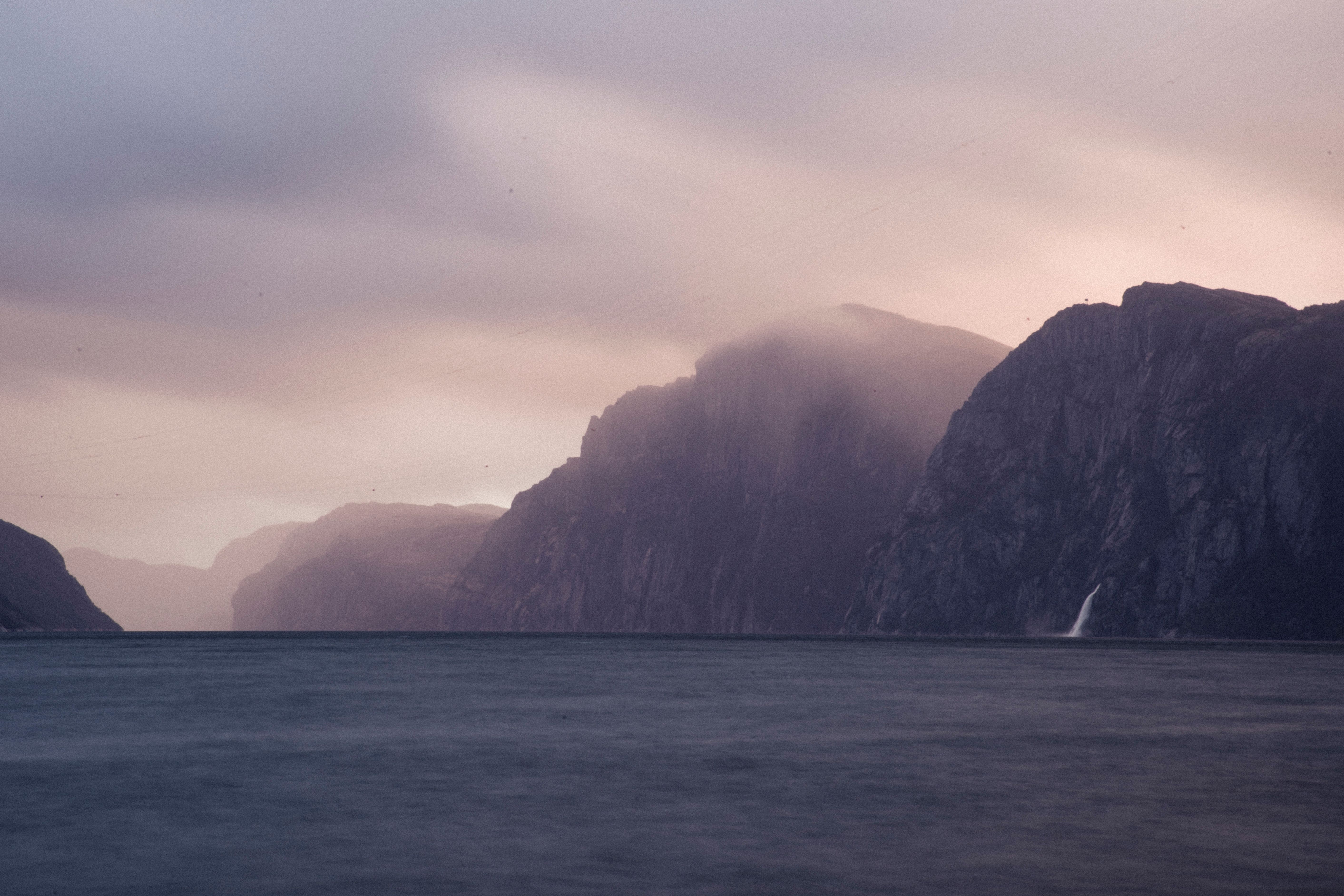Scenic View of Mountains near the Sea · Free Stock Photo