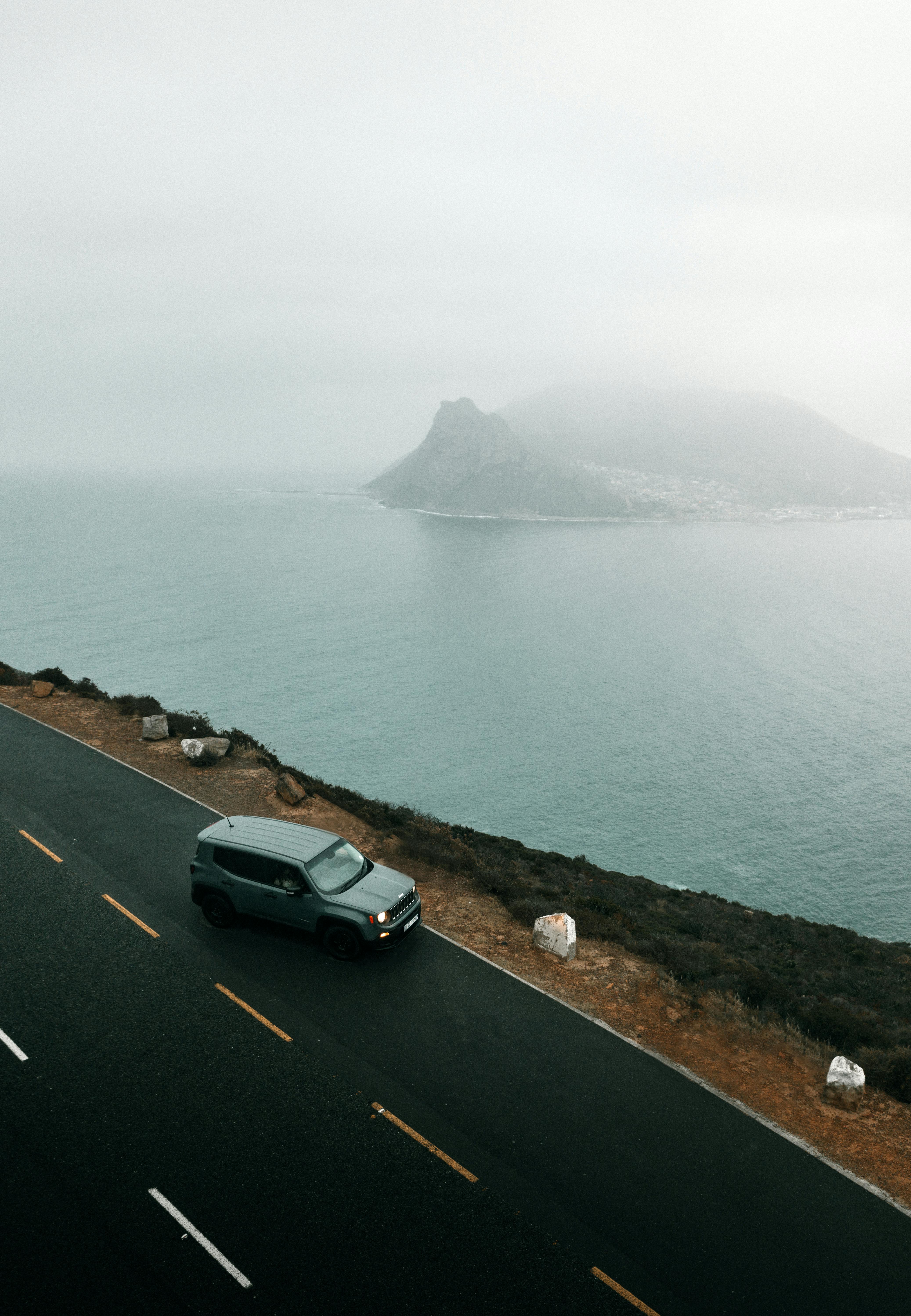Aerial View of an SUV Car on the Road · Free Stock Photo