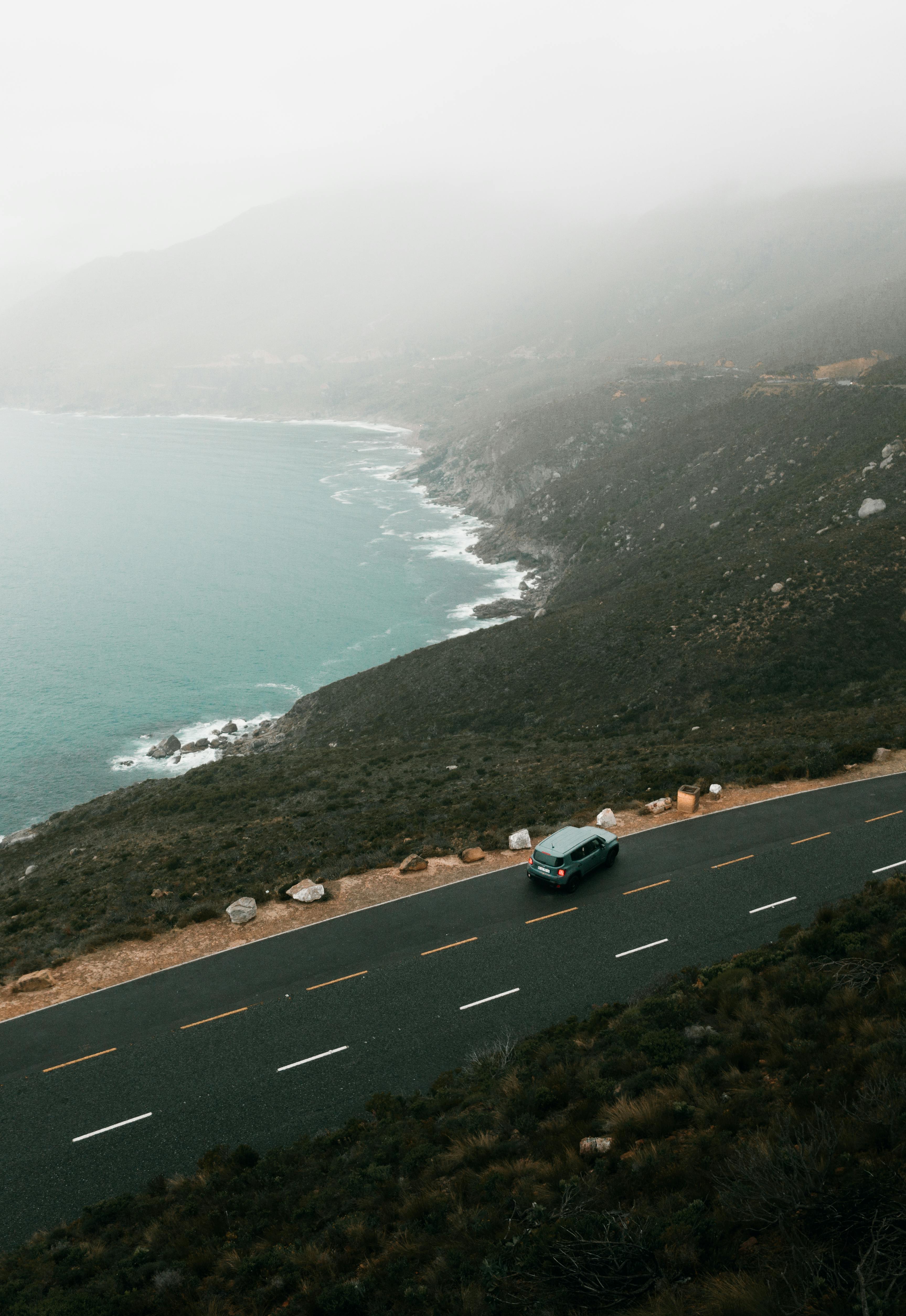Drone Shot of a Car on Road · Free Stock Photo