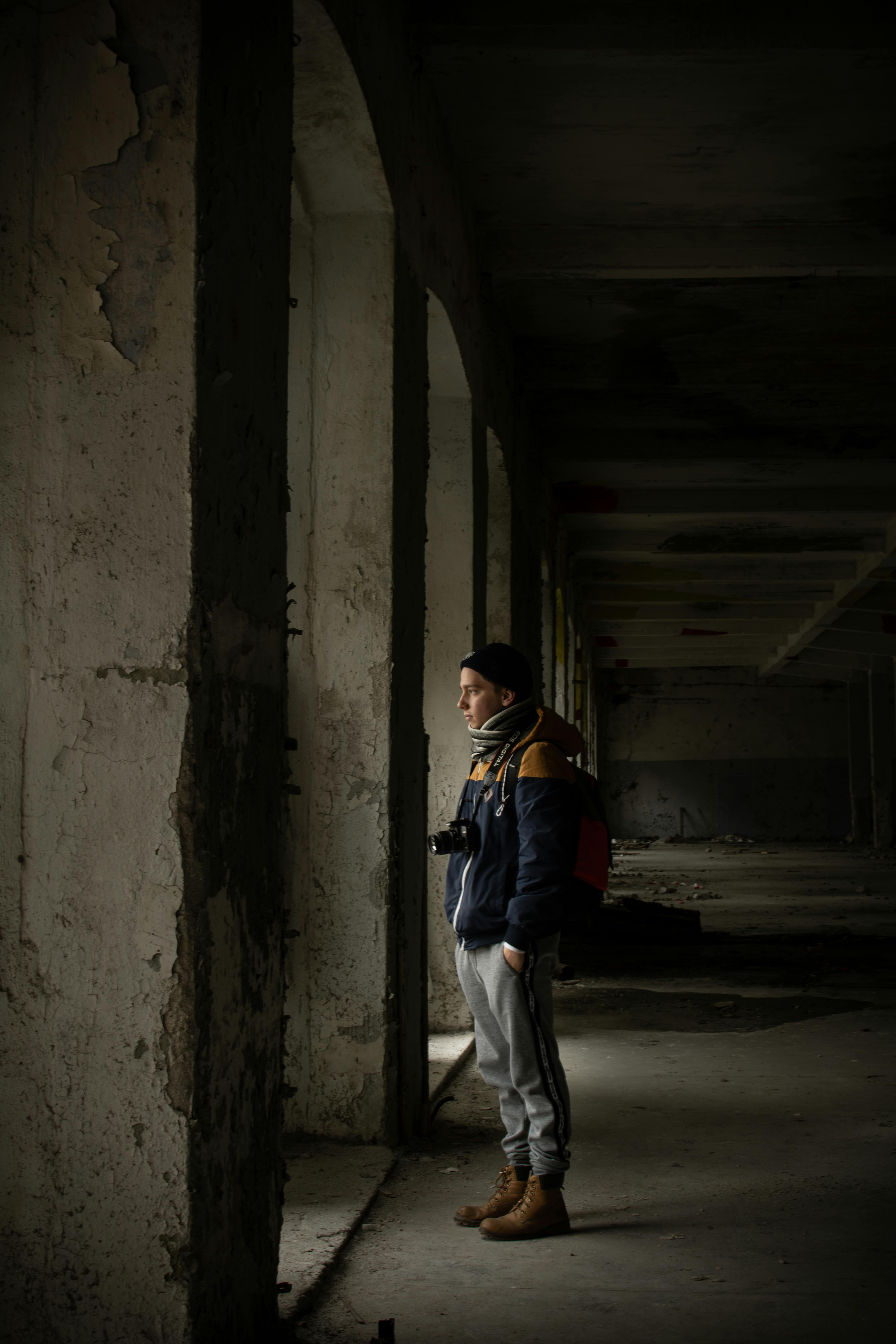 Man Standing Inside the Building · Free Stock Photo