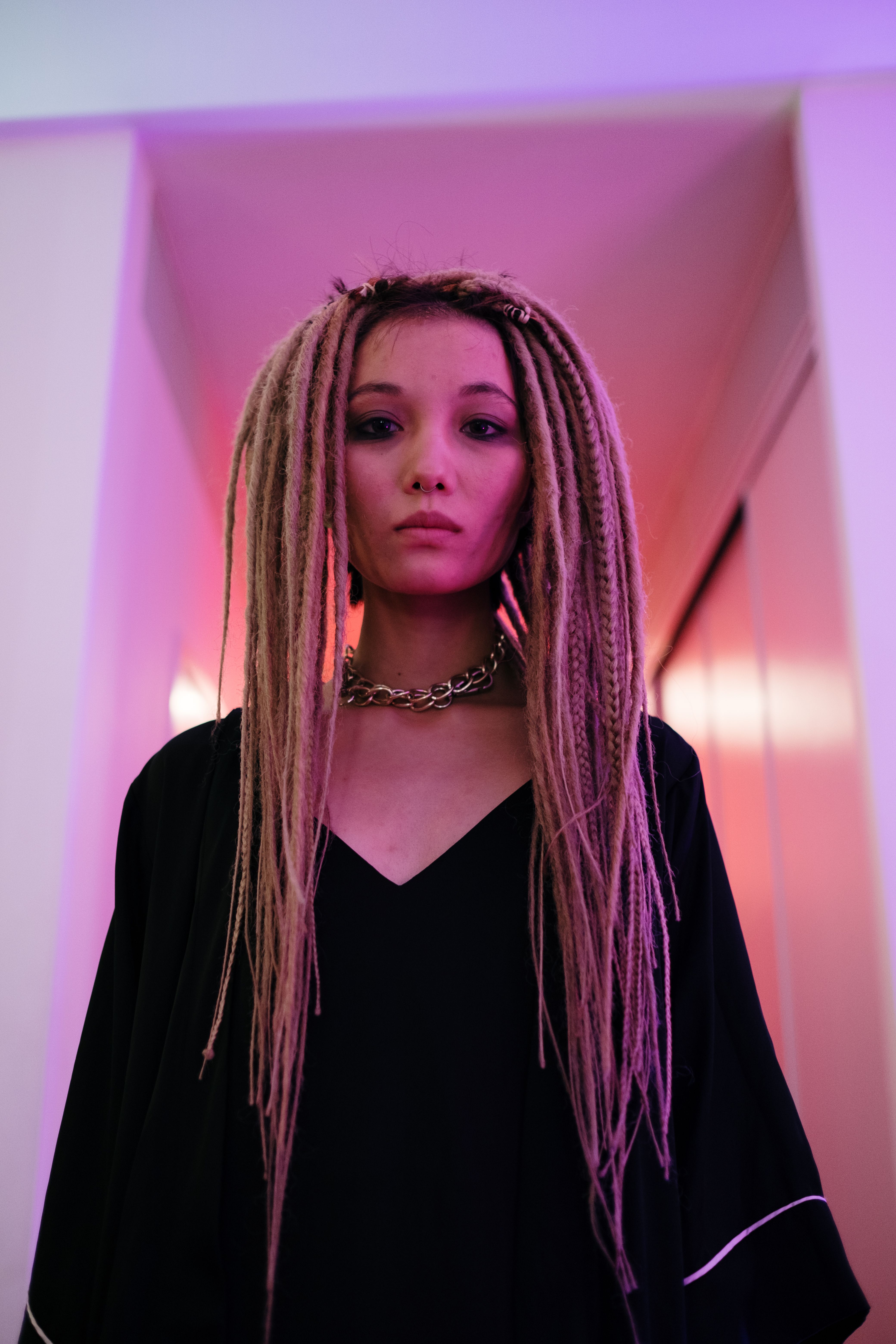 Portrait of Young Woman with Dreadlocks in Glasses · Free Stock Photo