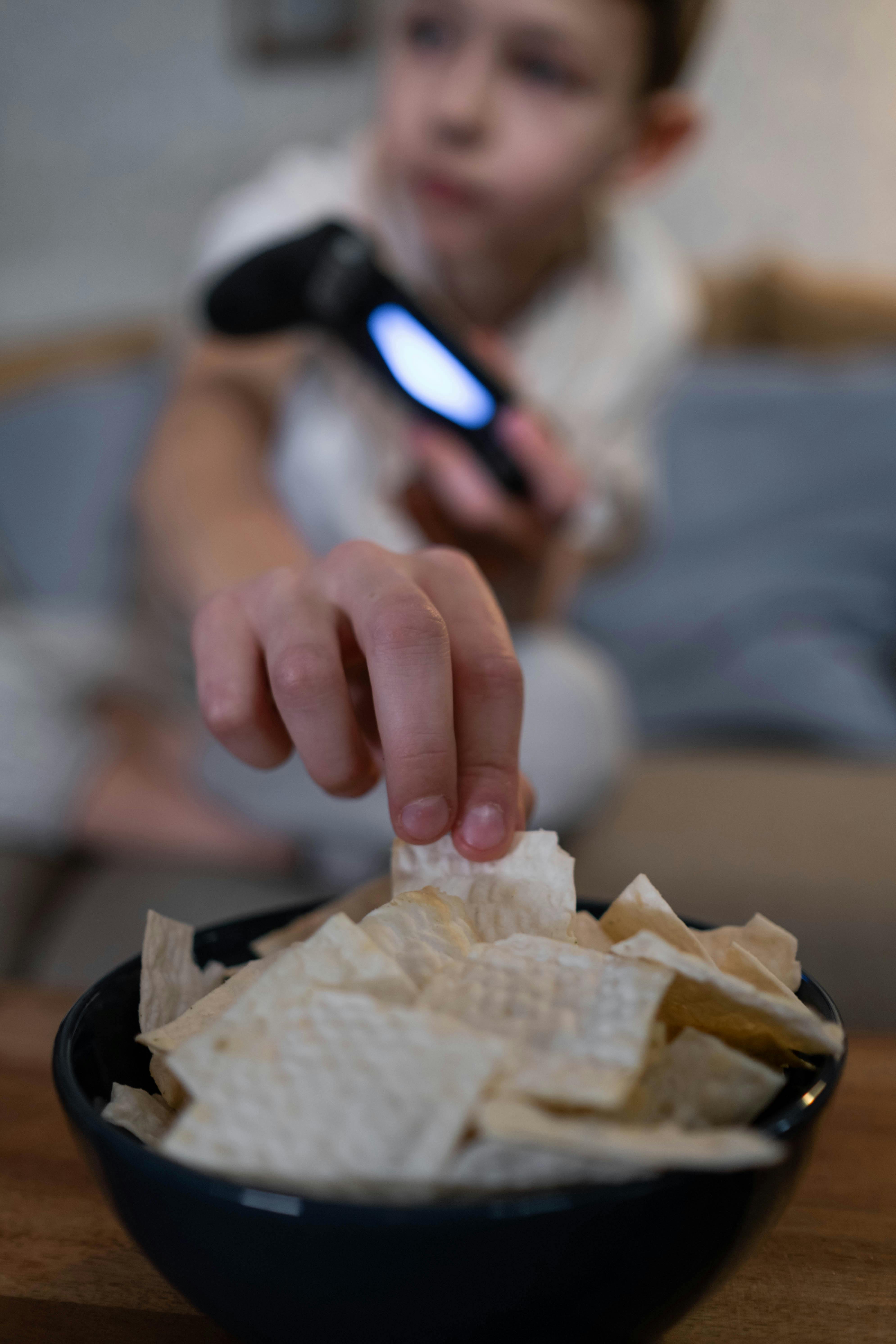 Dipping Finger Foods in Cheese · Free Stock Photo