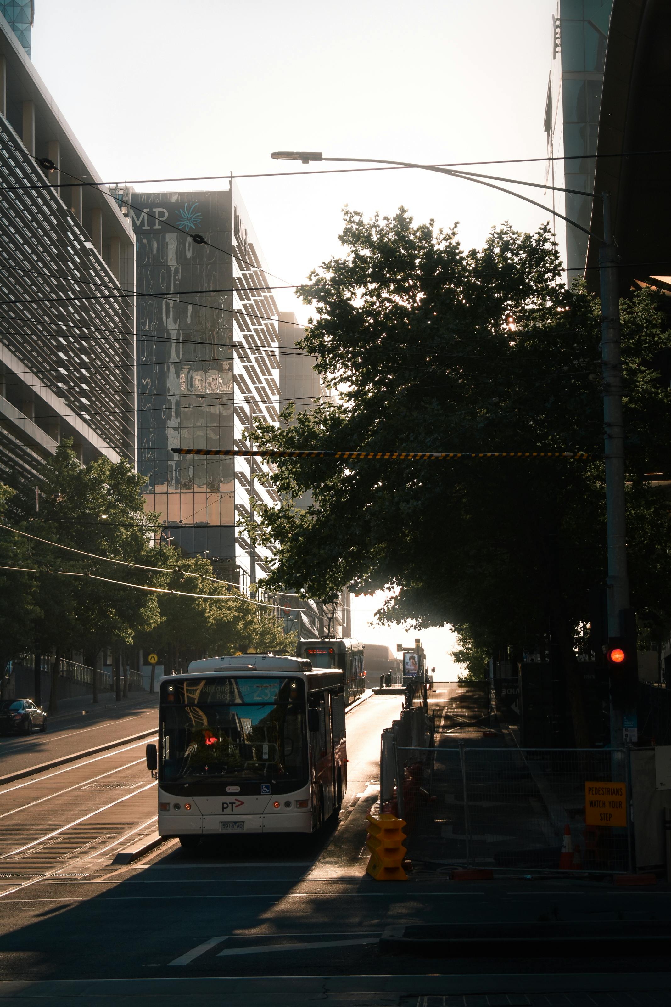 Vintage Tour Bus on Street · Free Stock Photo