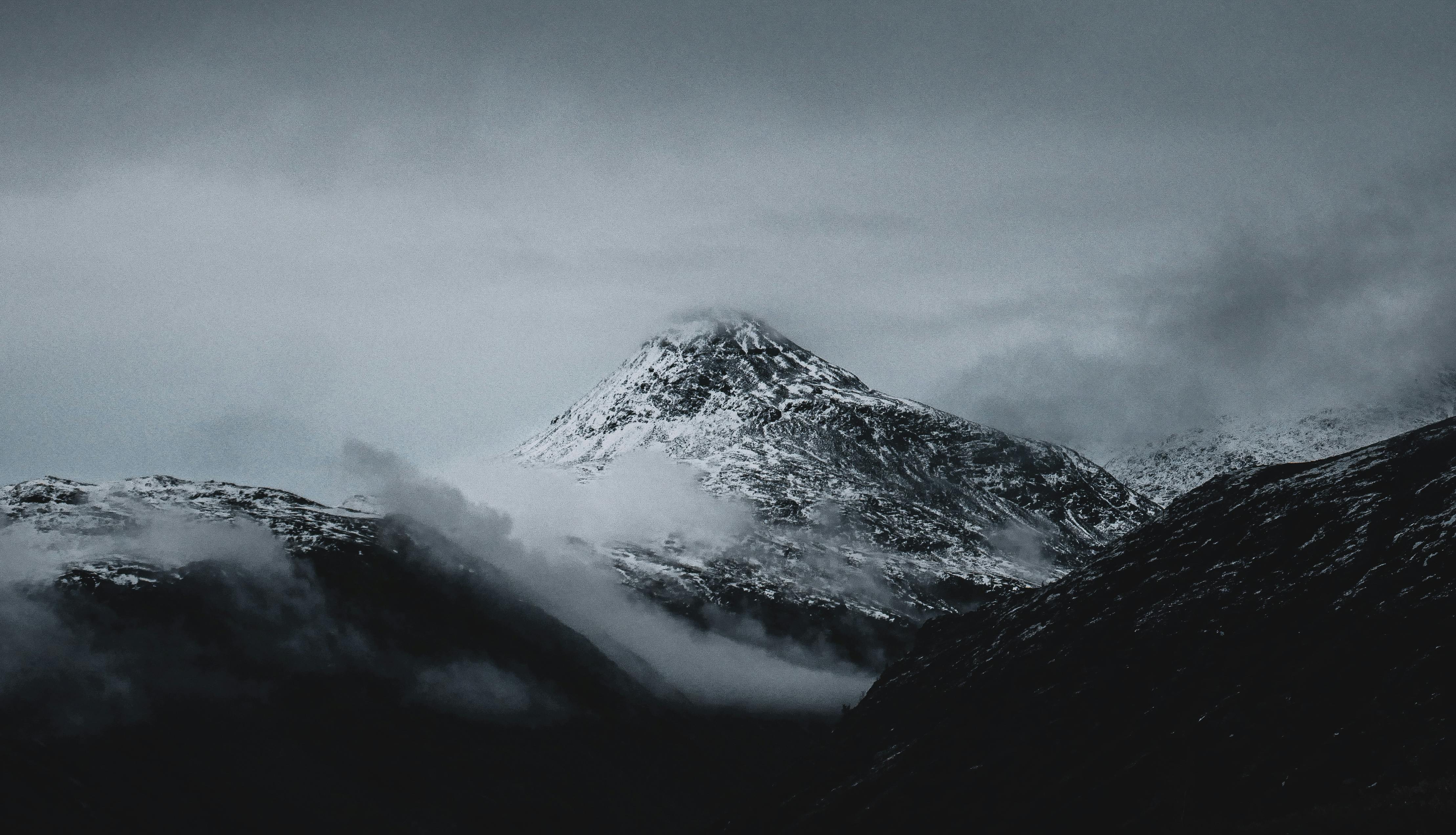 White Clouds over Snow Covered Mountains · Free Stock Photo