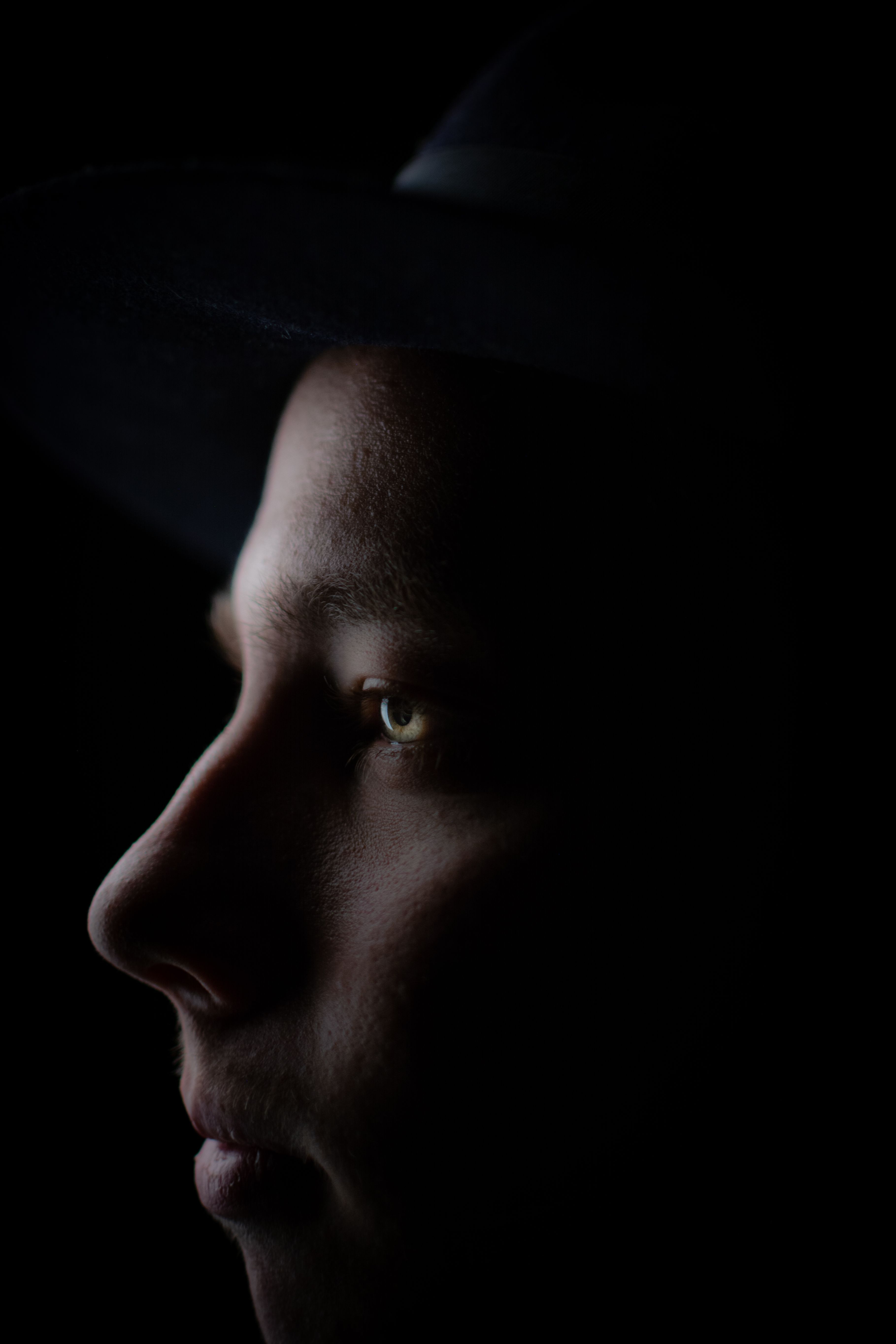 Woman in Black Eyes in the Dark · Free Stock Photo