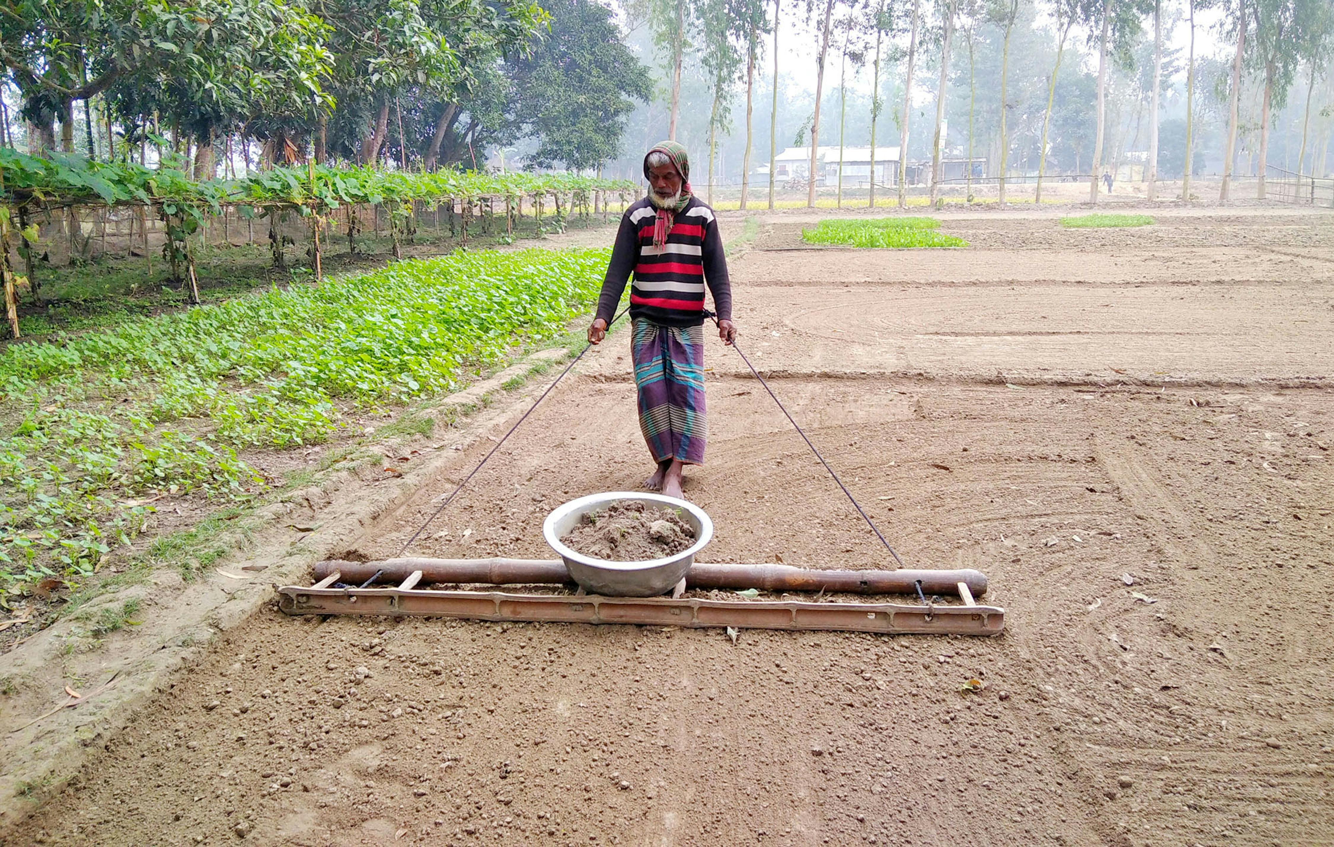 Man Working in a Field · Free Stock Photo