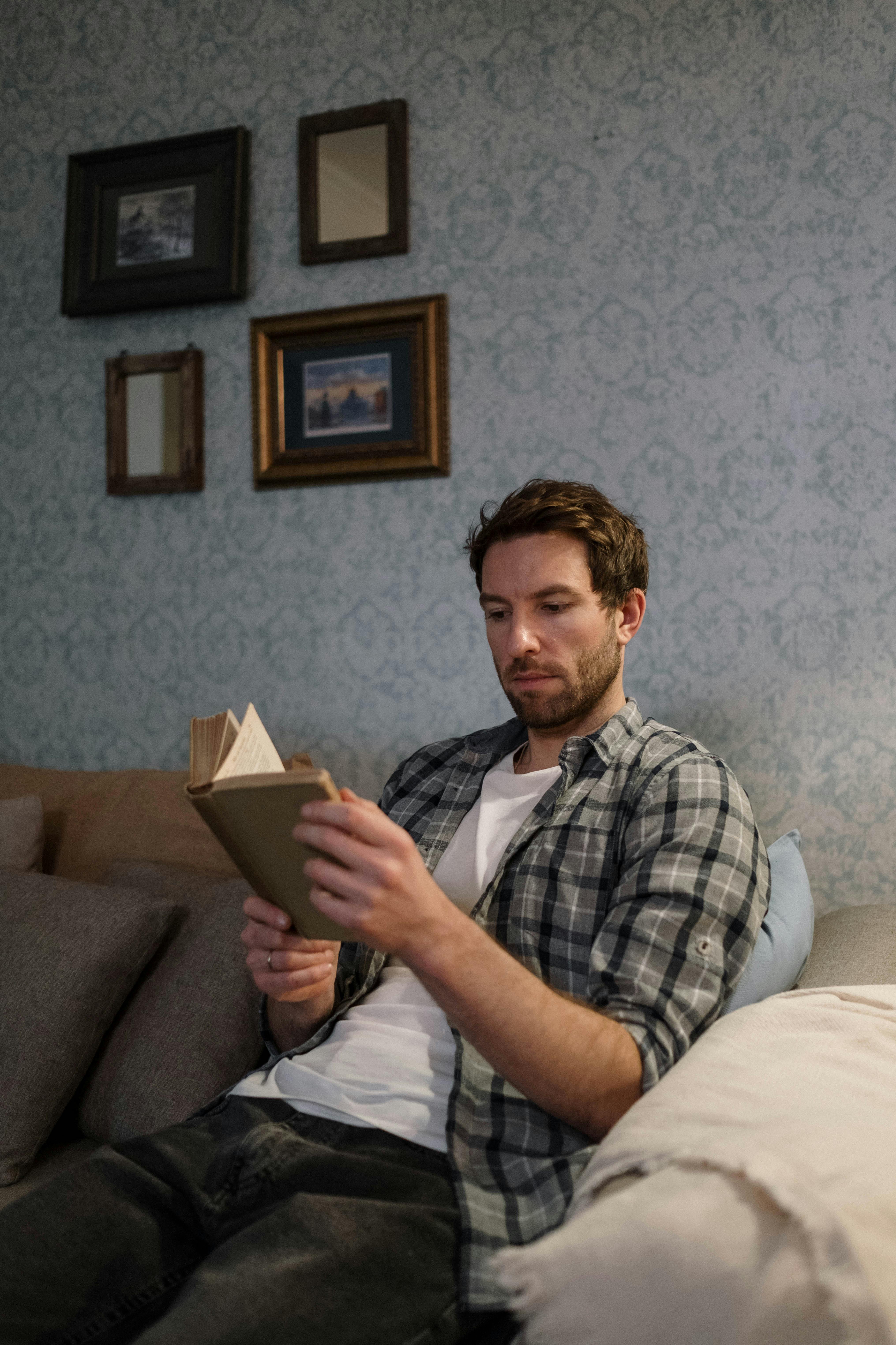 A Bearded Man Reading Book · Free Stock Photo