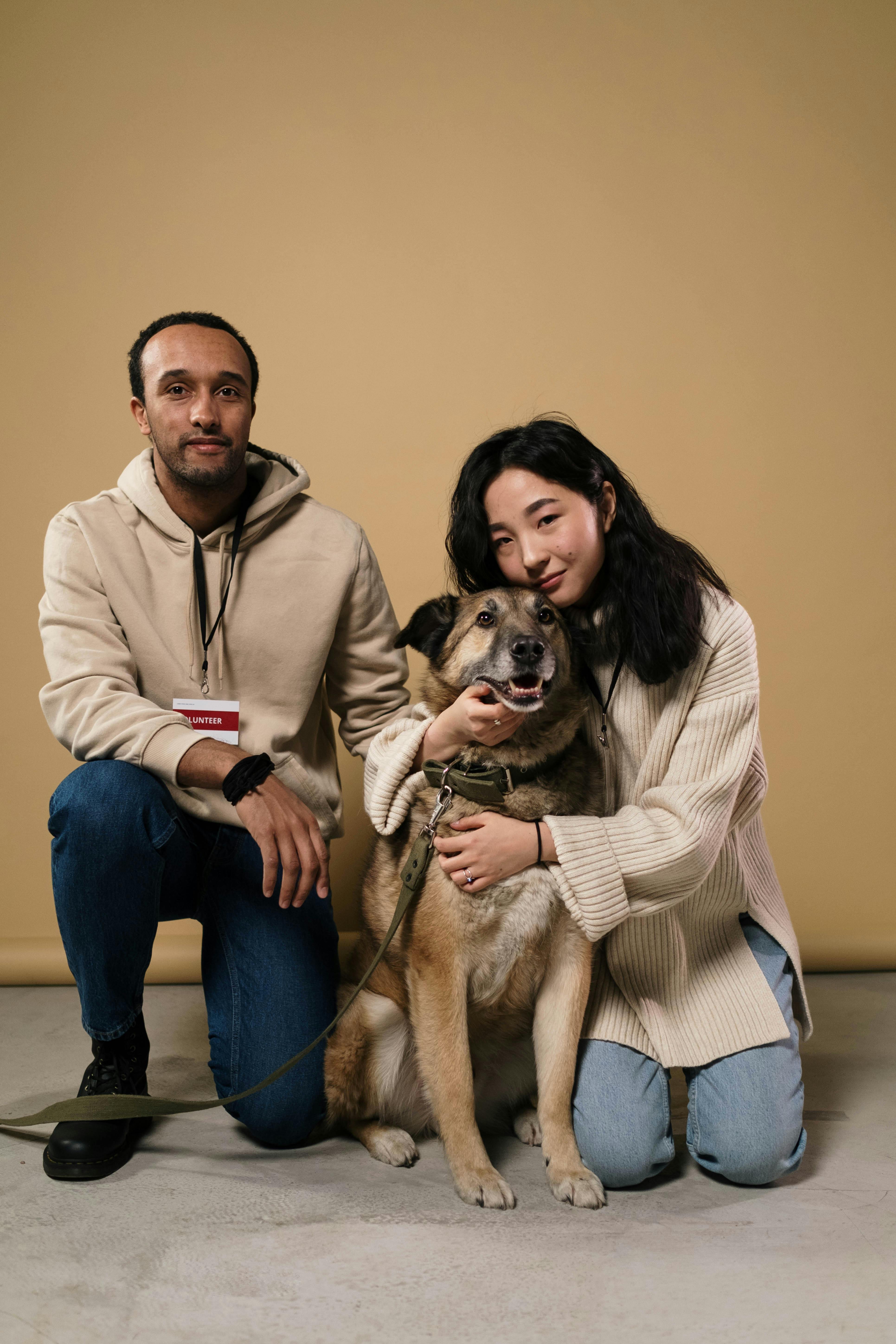 Dog Owners and their Pet Dog · Free Stock Photo