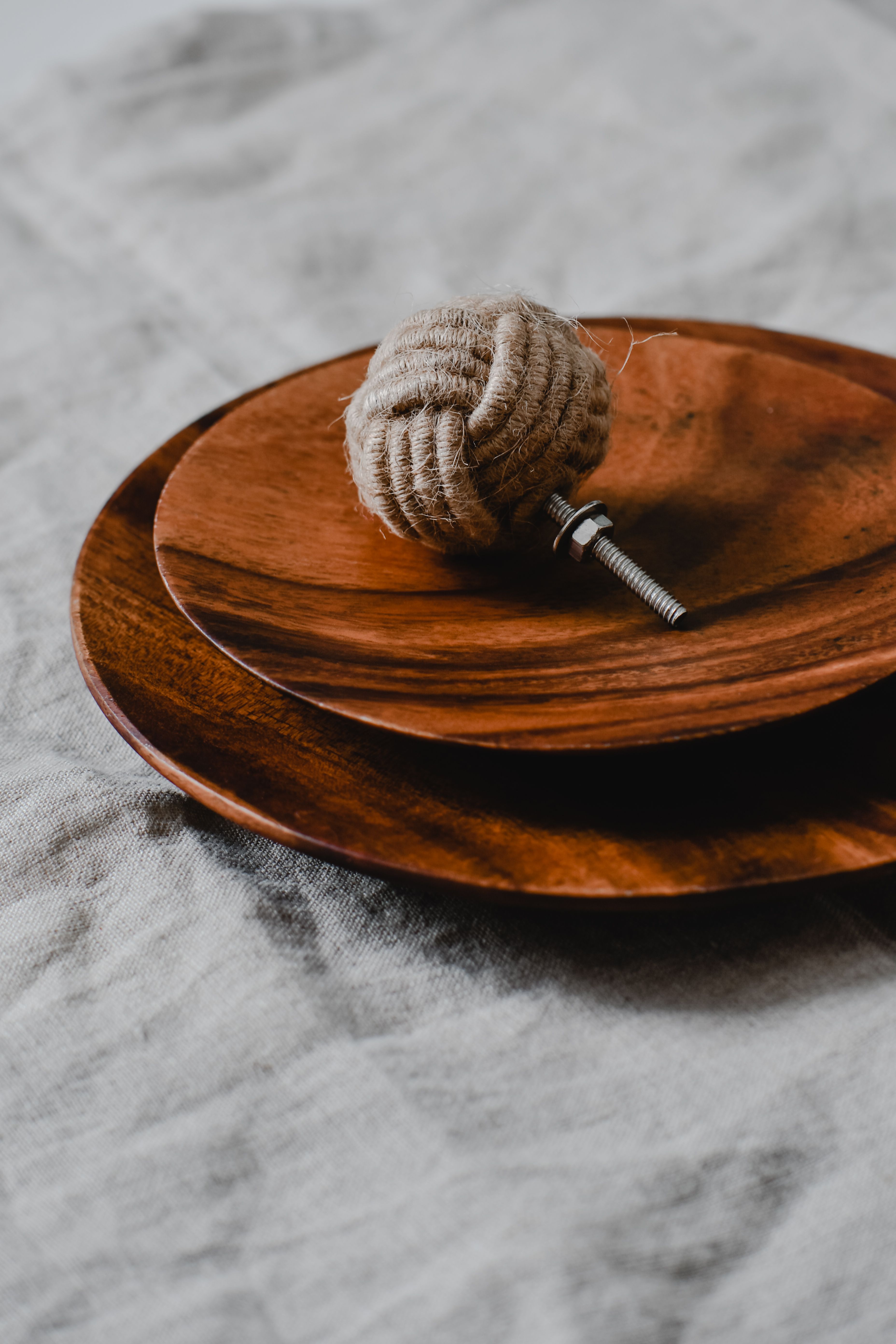 Brown Yarn on Brown Wooden Round Plate · Free Stock Photo