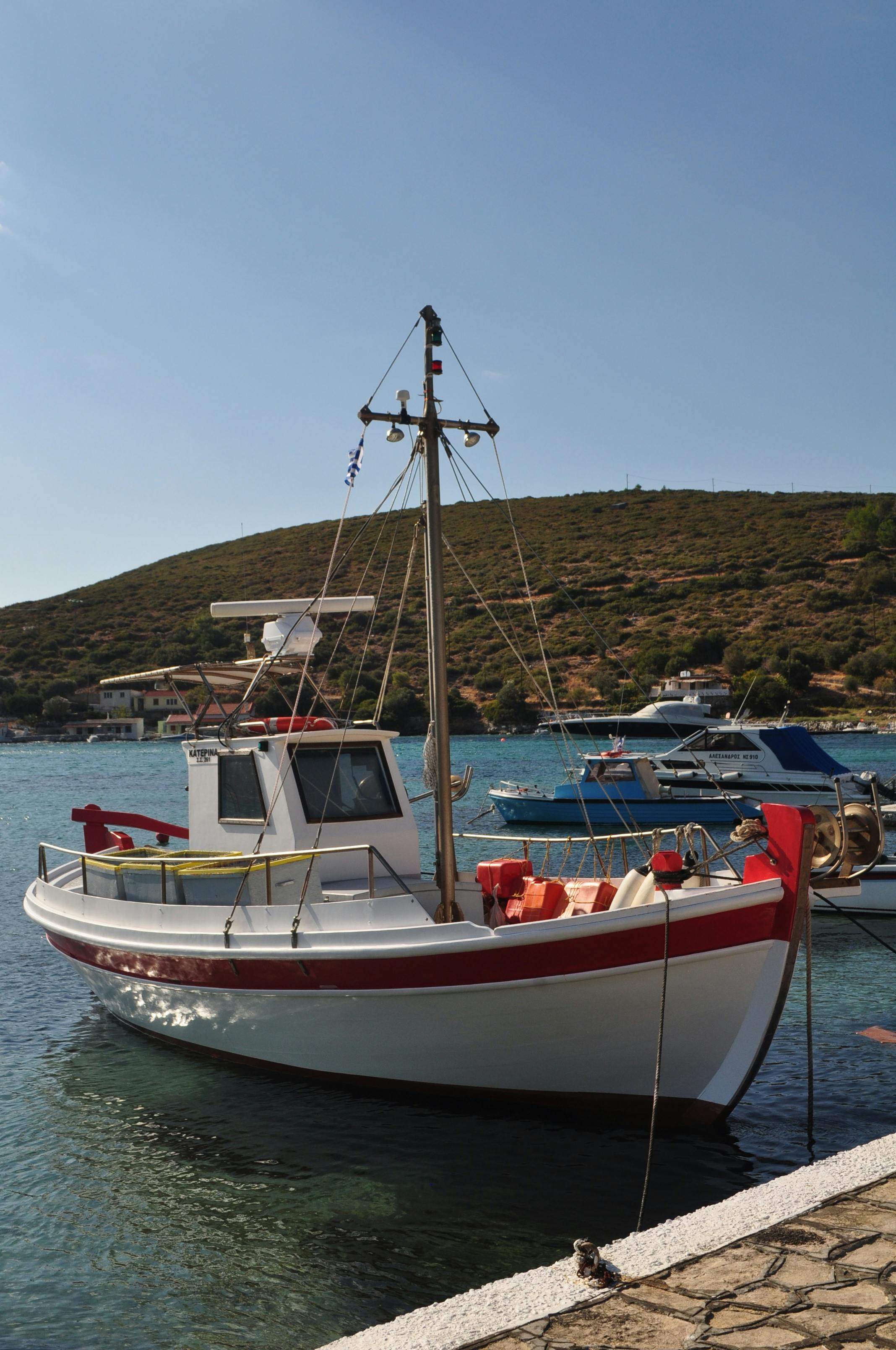 Sunlight over Fishing Boats in Harbor · Free Stock Photo