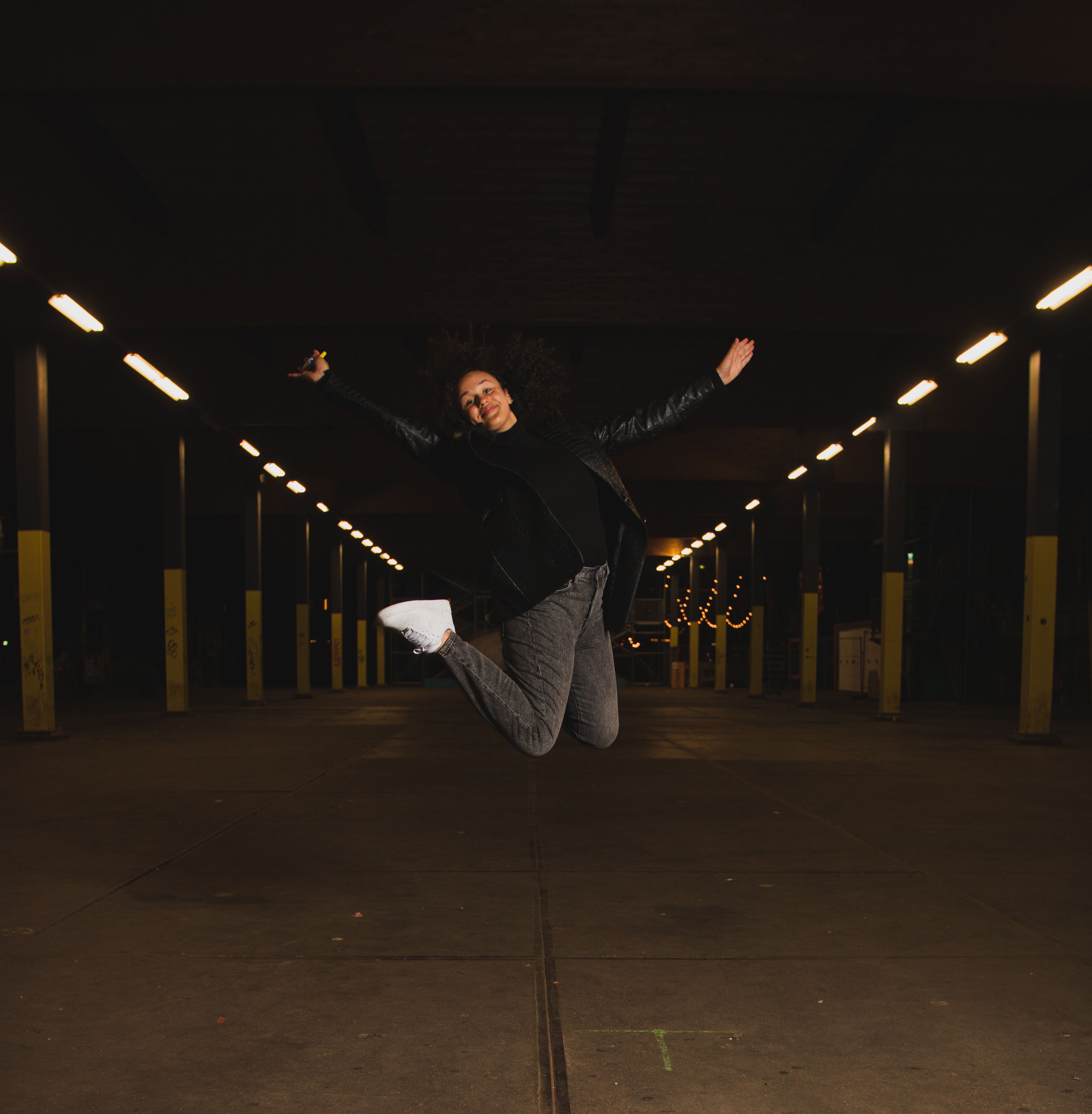 Happy Woman Jumping at Night · Free Stock Photo