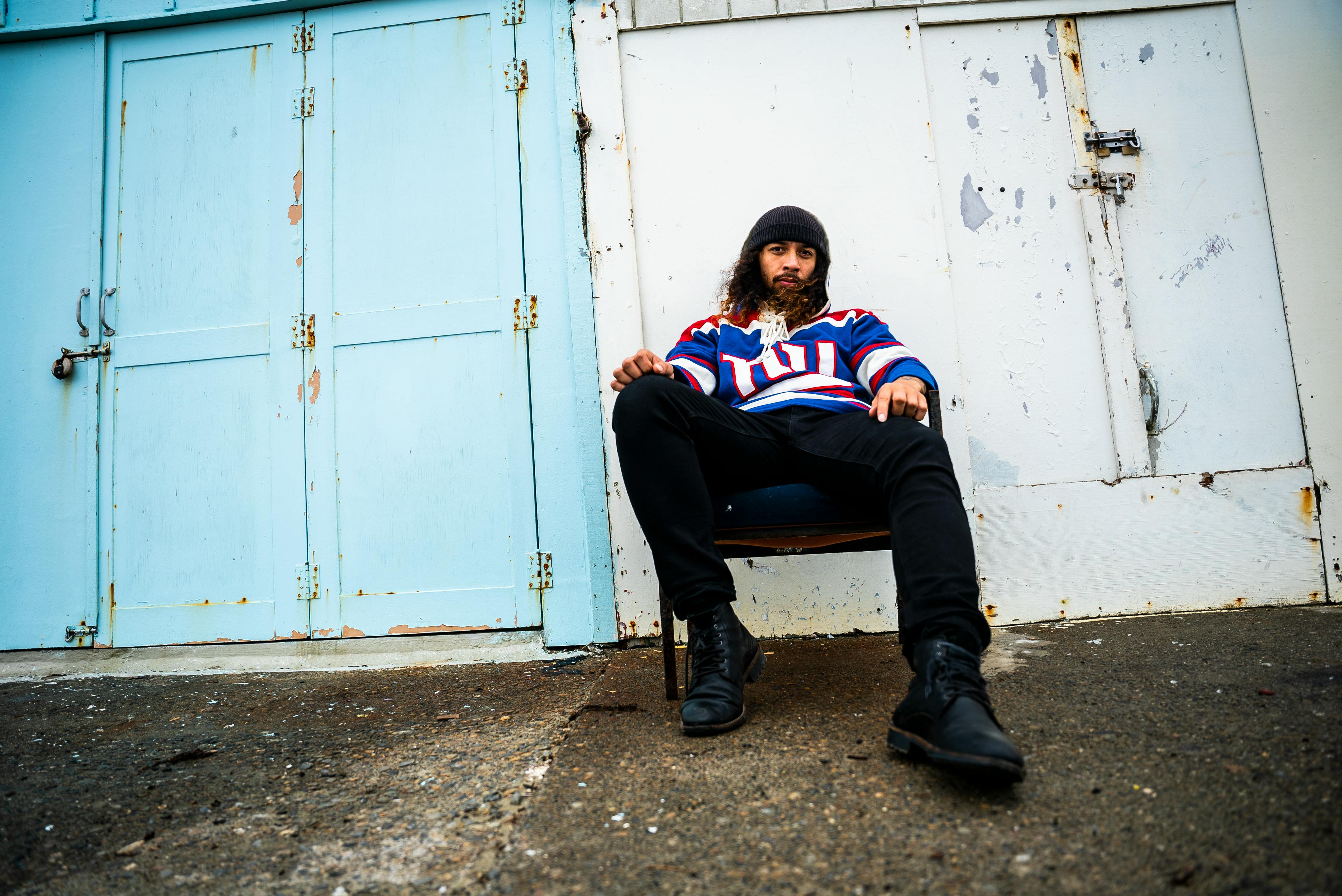 Men Walking among Sitting Places · Free Stock Photo