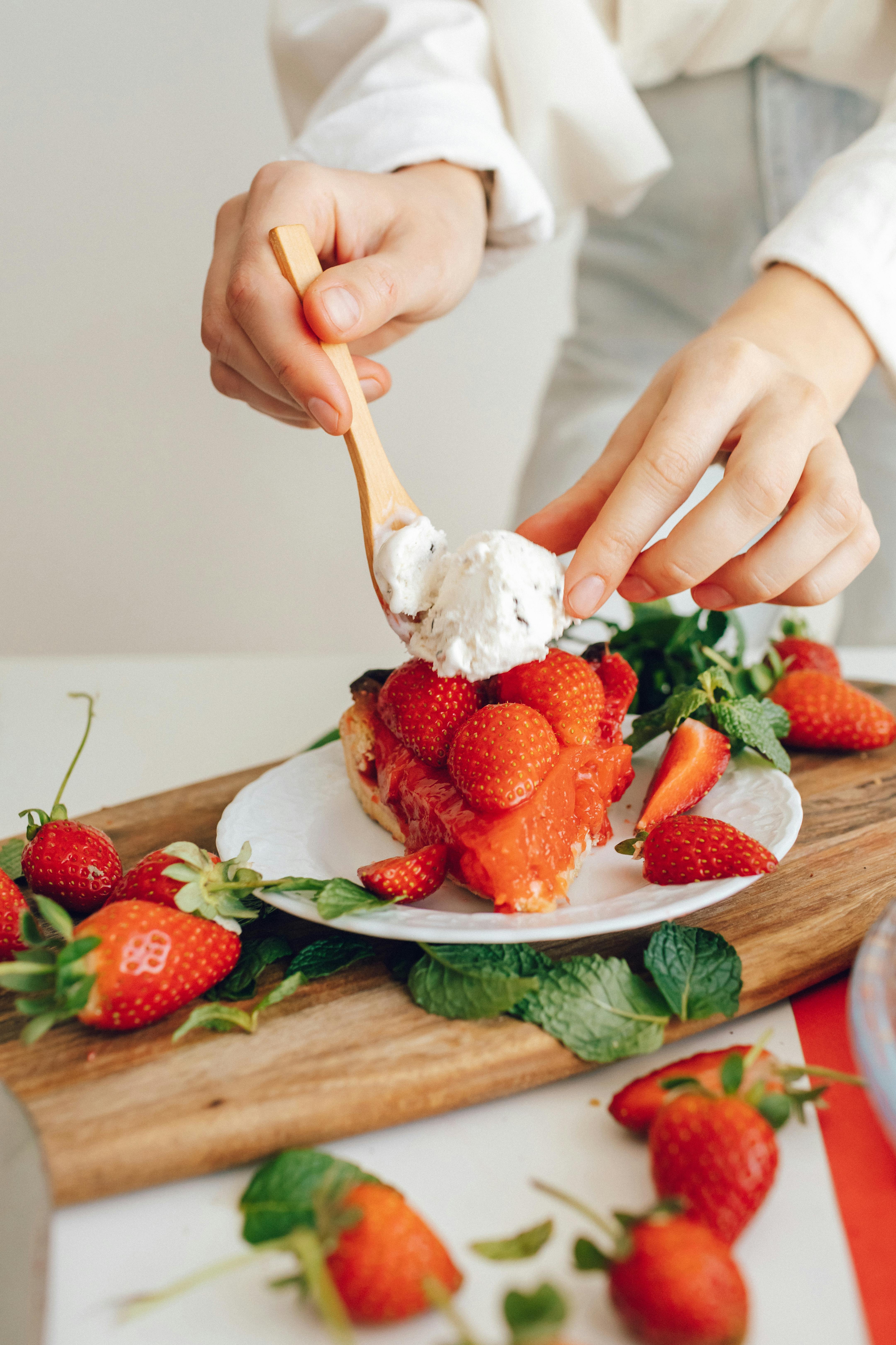 Person Preparing a Desert on Ceramic Plate · Free Stock Photo