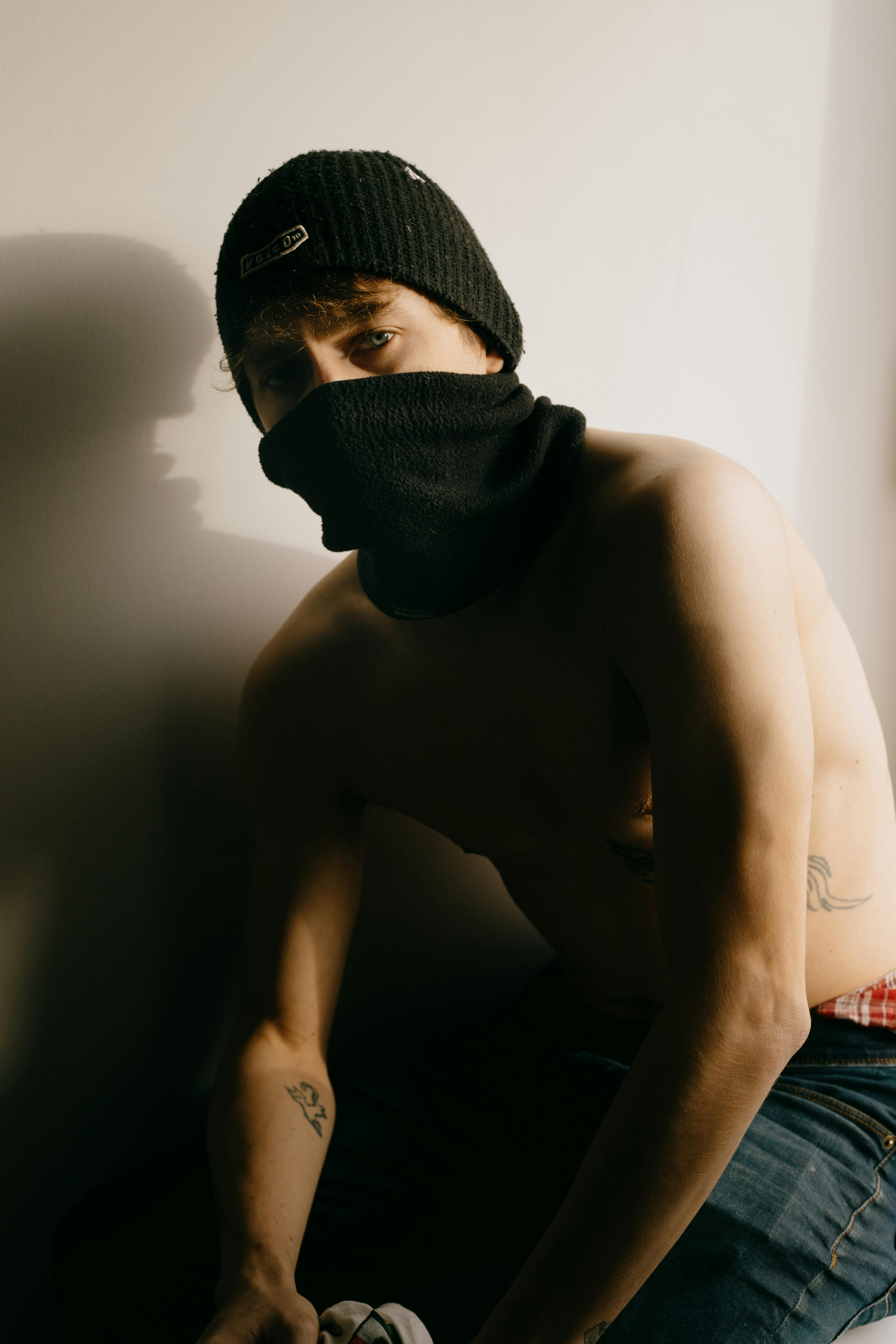 Topless Man Wearing Black Knit Cap · Free Stock Photo