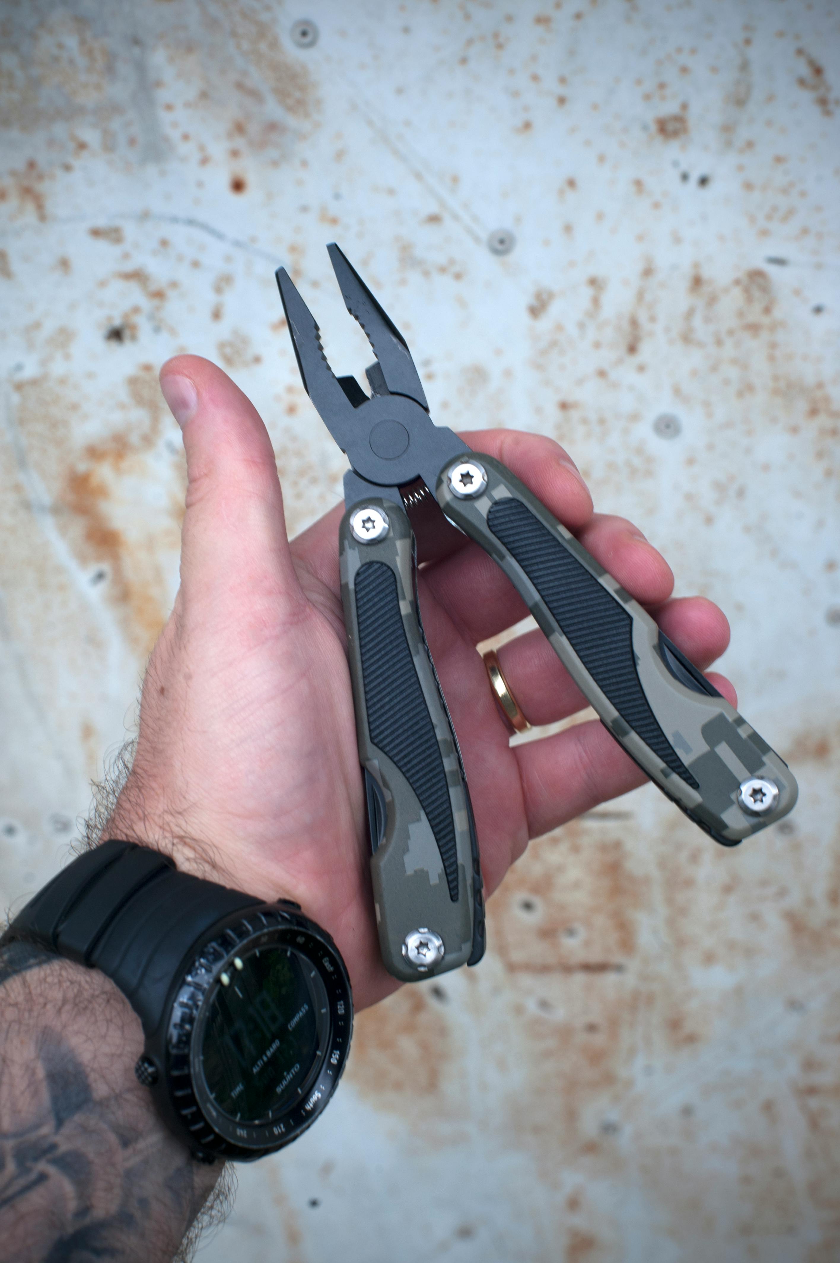 Person Holding a Pliers · Free Stock Photo