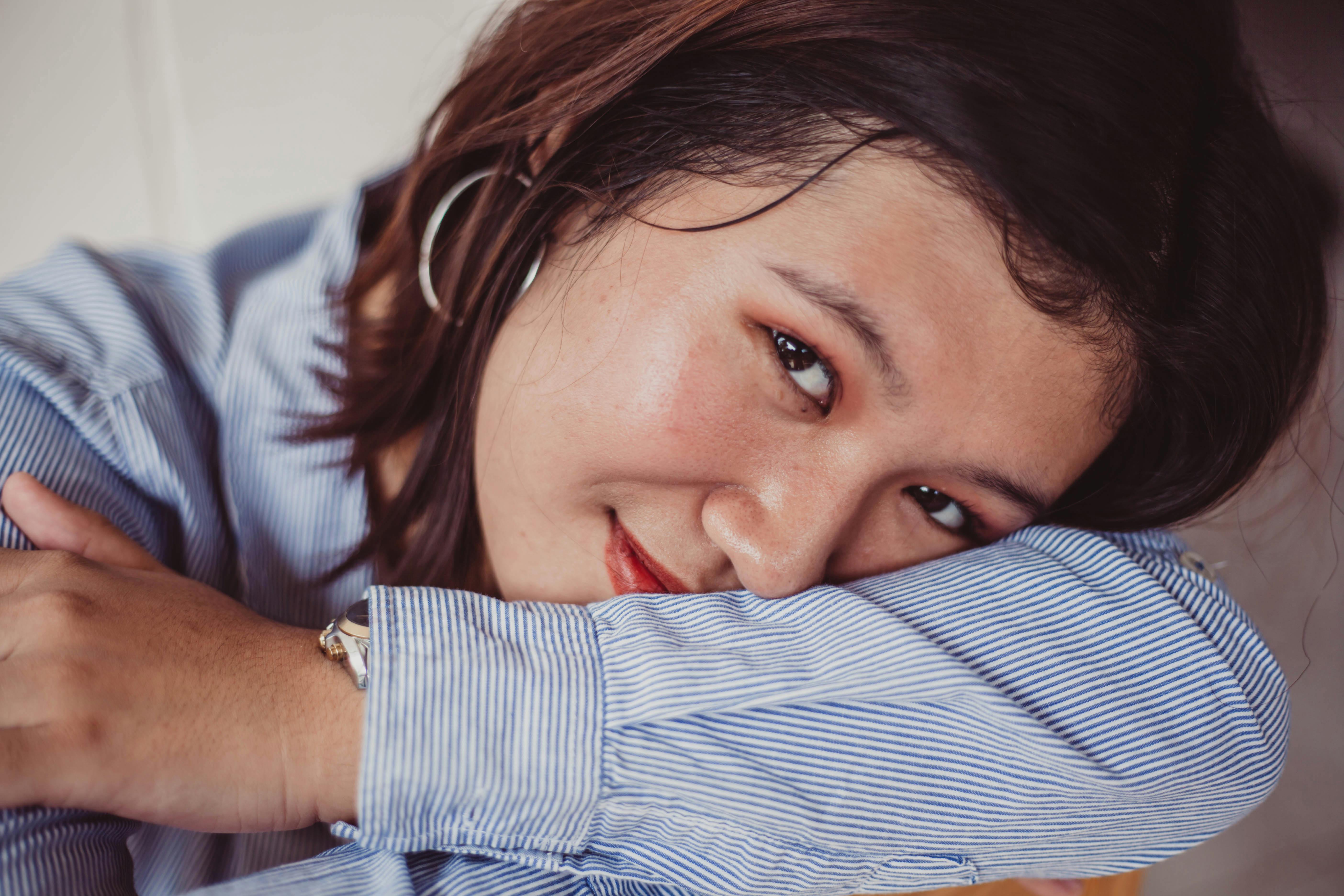Woman Wearing Baby Blue Long Sleeve Shirt · Free Stock Photo