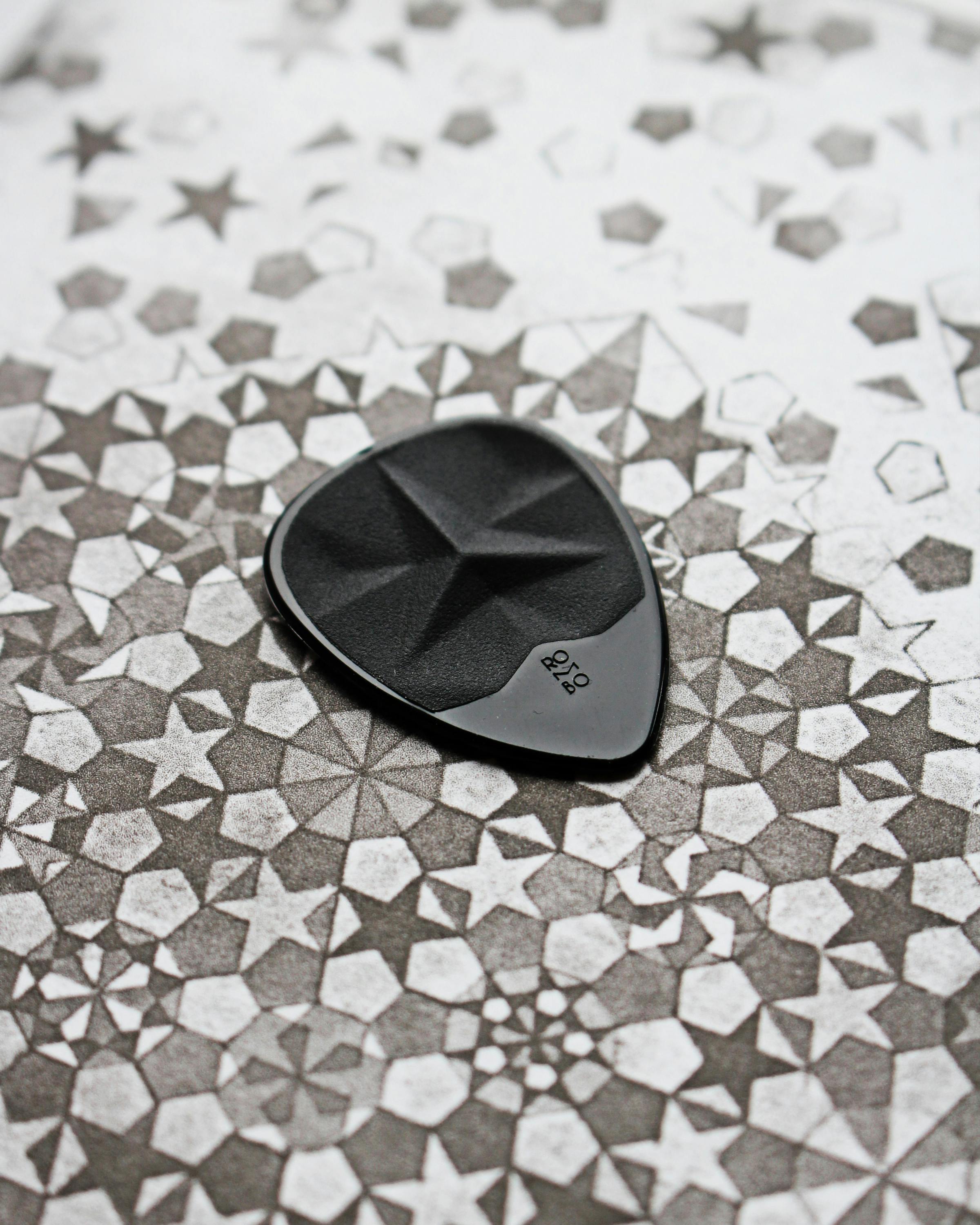 Black Guitar Pick · Free Stock Photo
