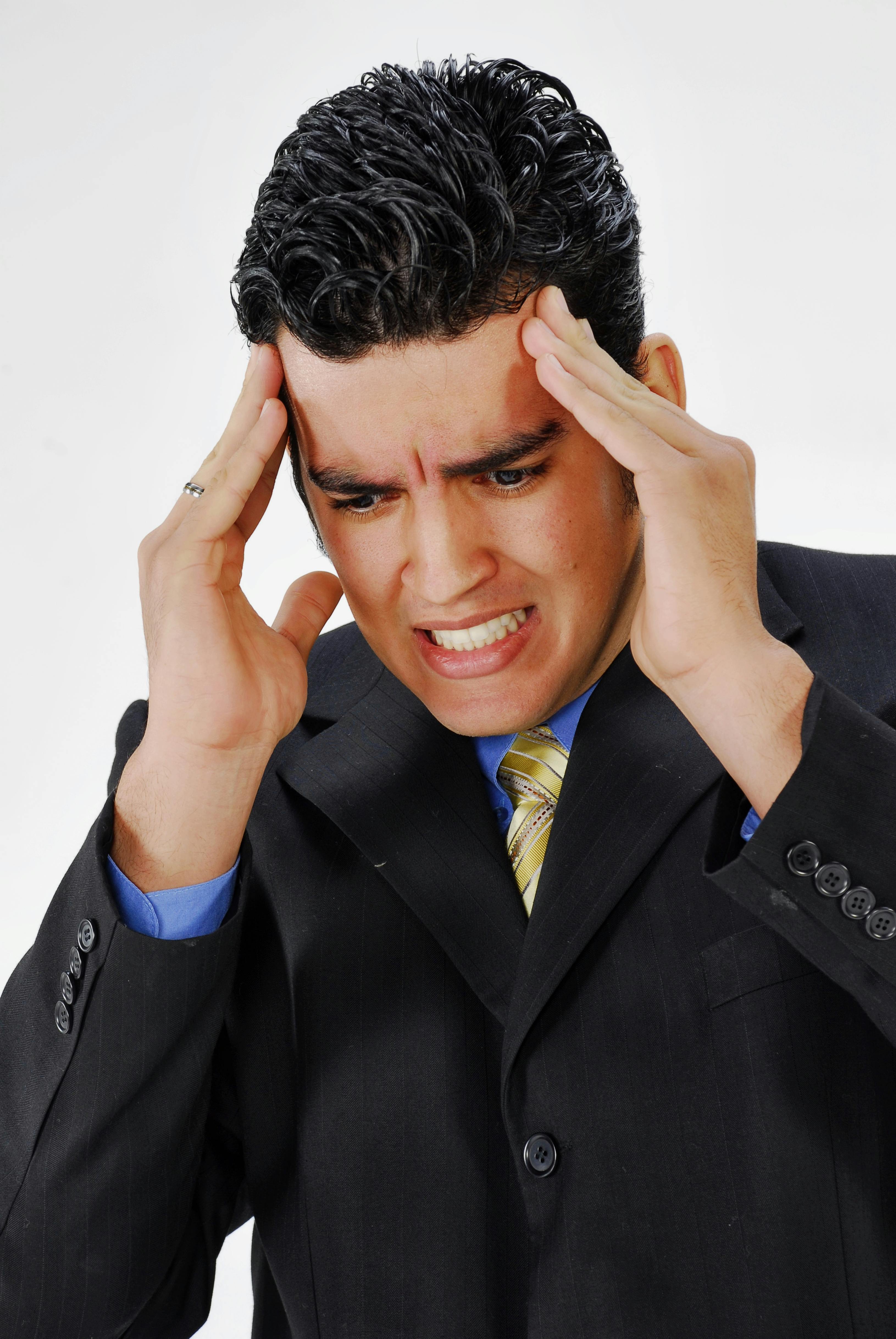 A Woman Touching Her Head · Free Stock Photo