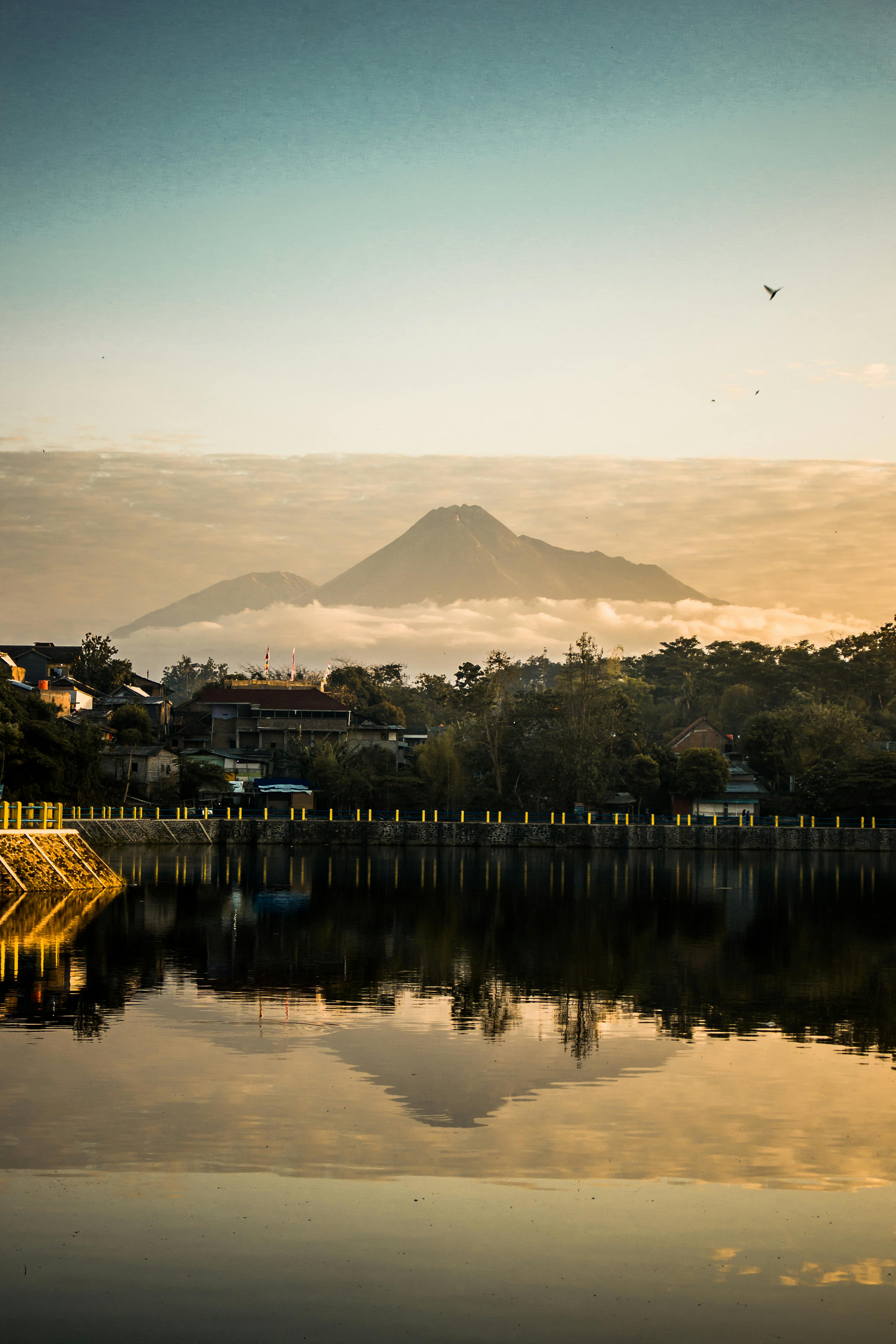 Mountain Reflection in Water on Sunset · Free Stock Photo