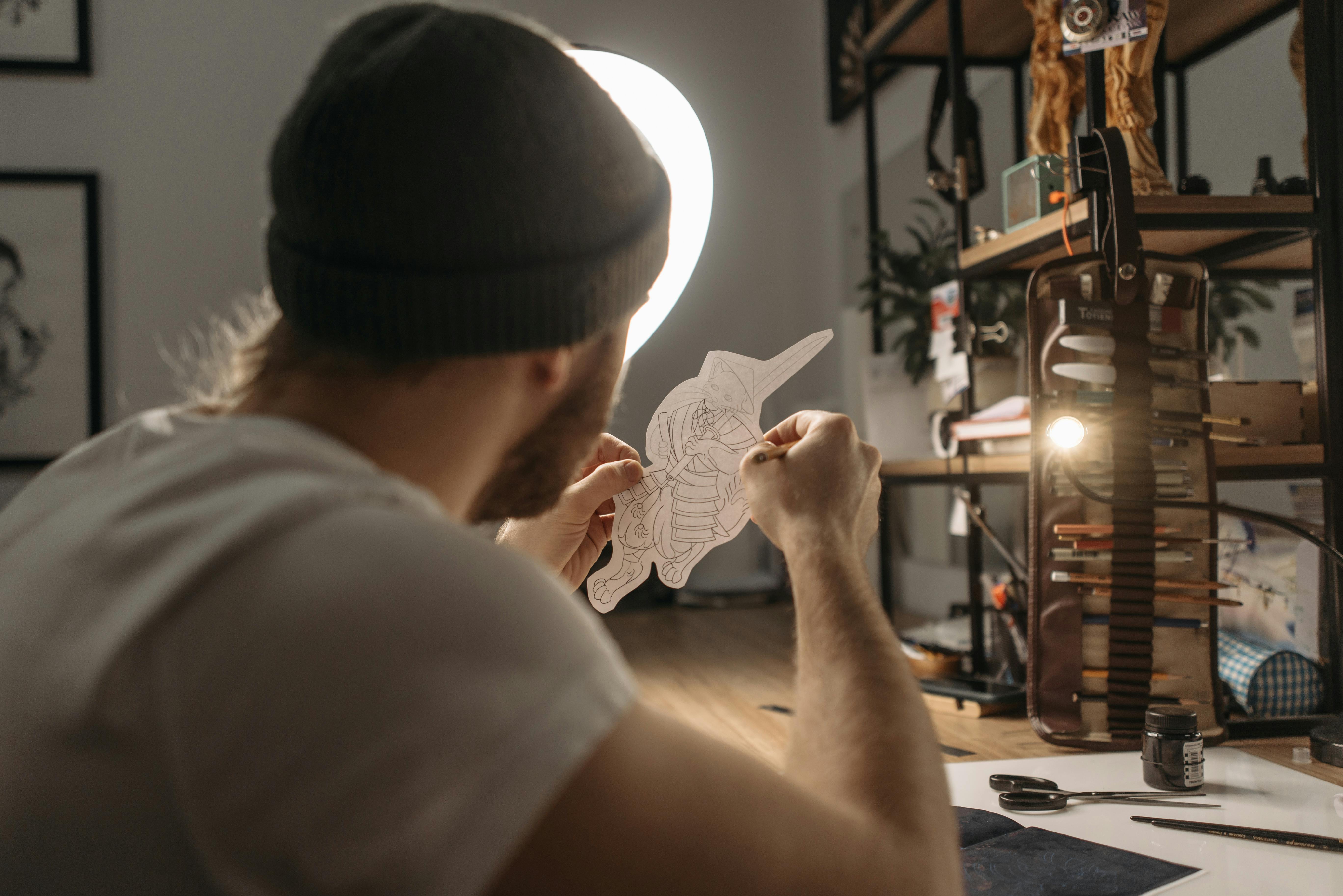 A Person Holding a Drawing · Free Stock Photo