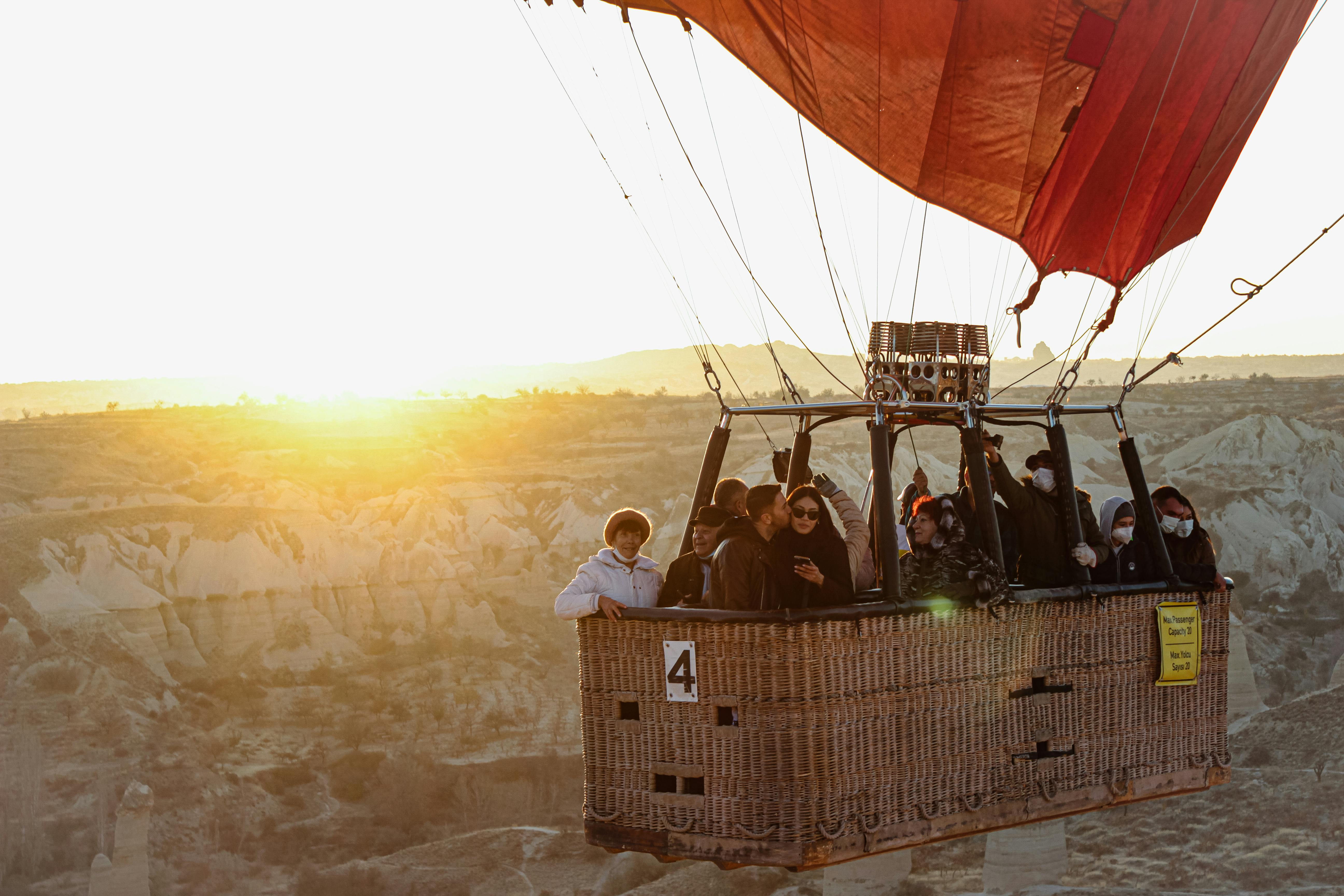 People Riding a Hot Air Balloon · Free Stock Photo