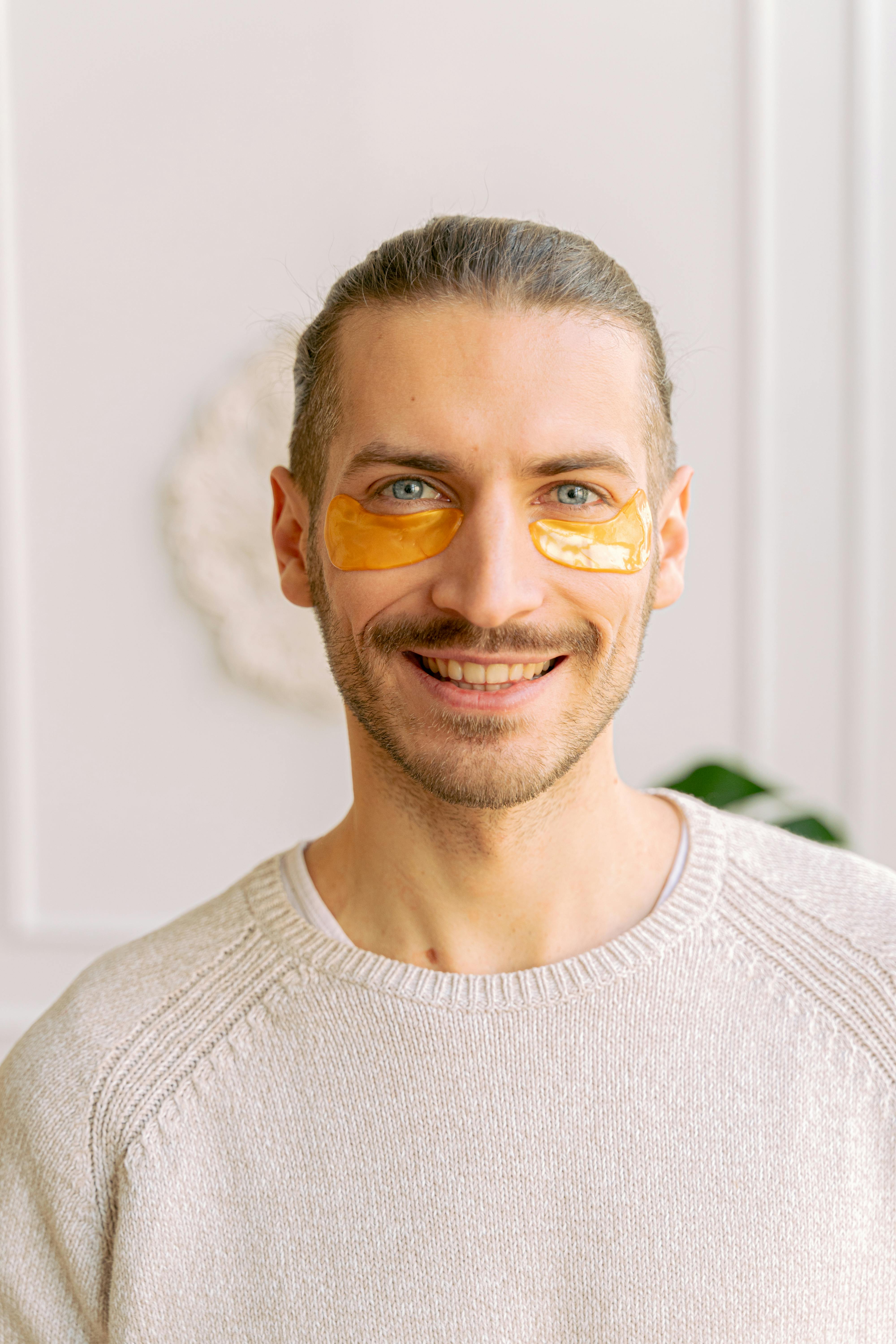 A Bearded Man Wearing Under Eye Masks · Free Stock Photo