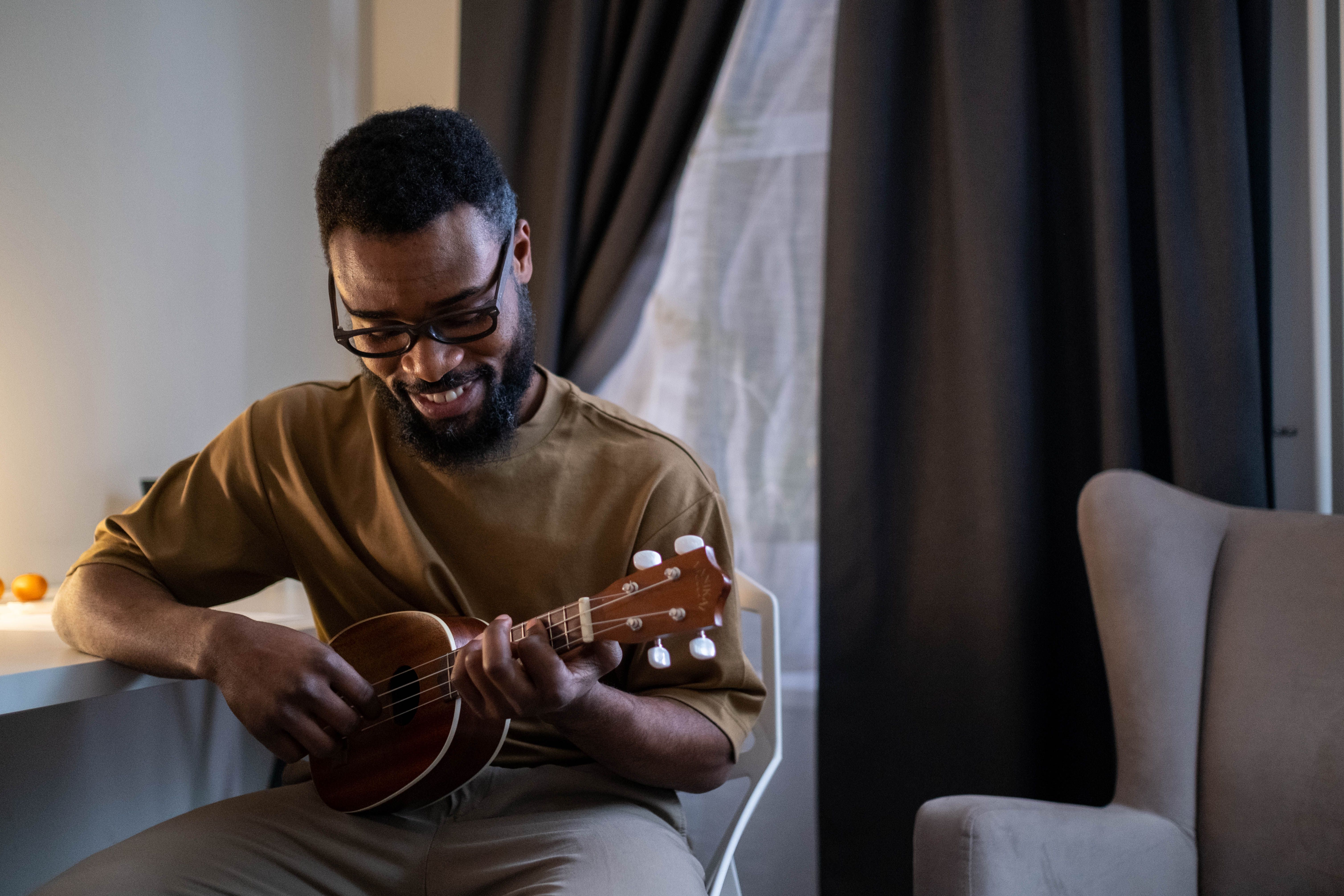 Man Holding Ukulele · Free Stock Photo