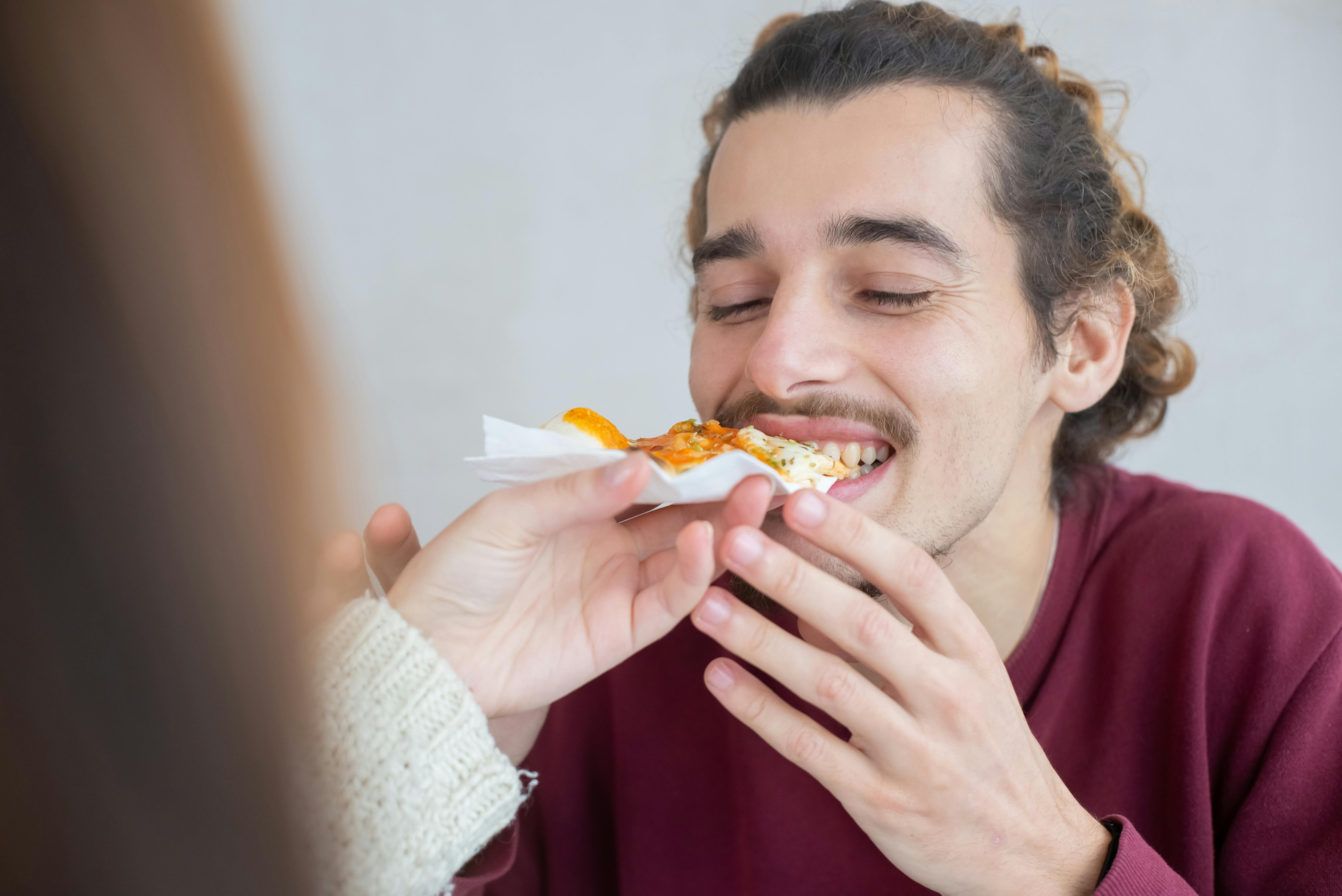 Happy People Eating Pizza · Free Stock Photo