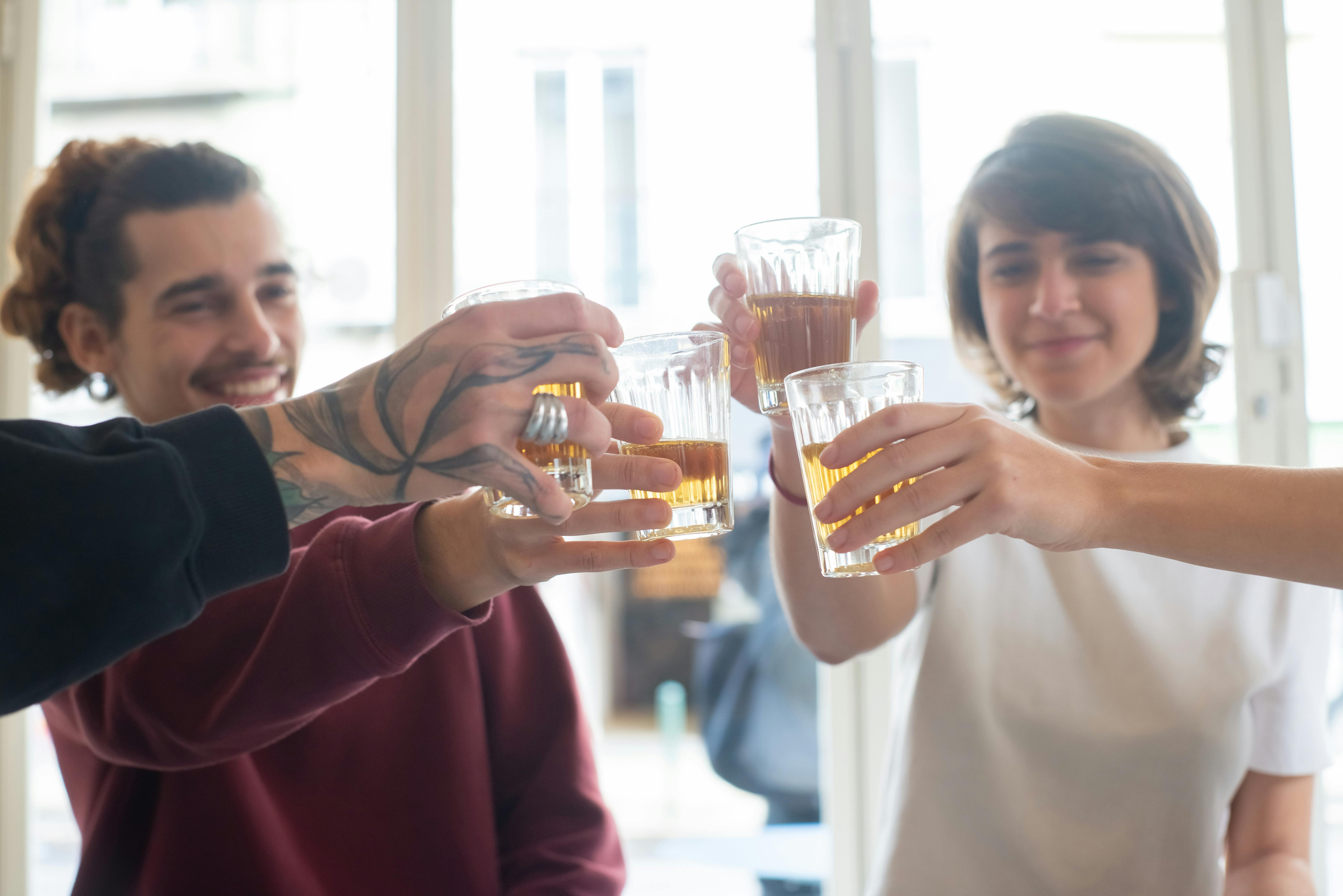 Group of Friends Having Beers · Free Stock Photo