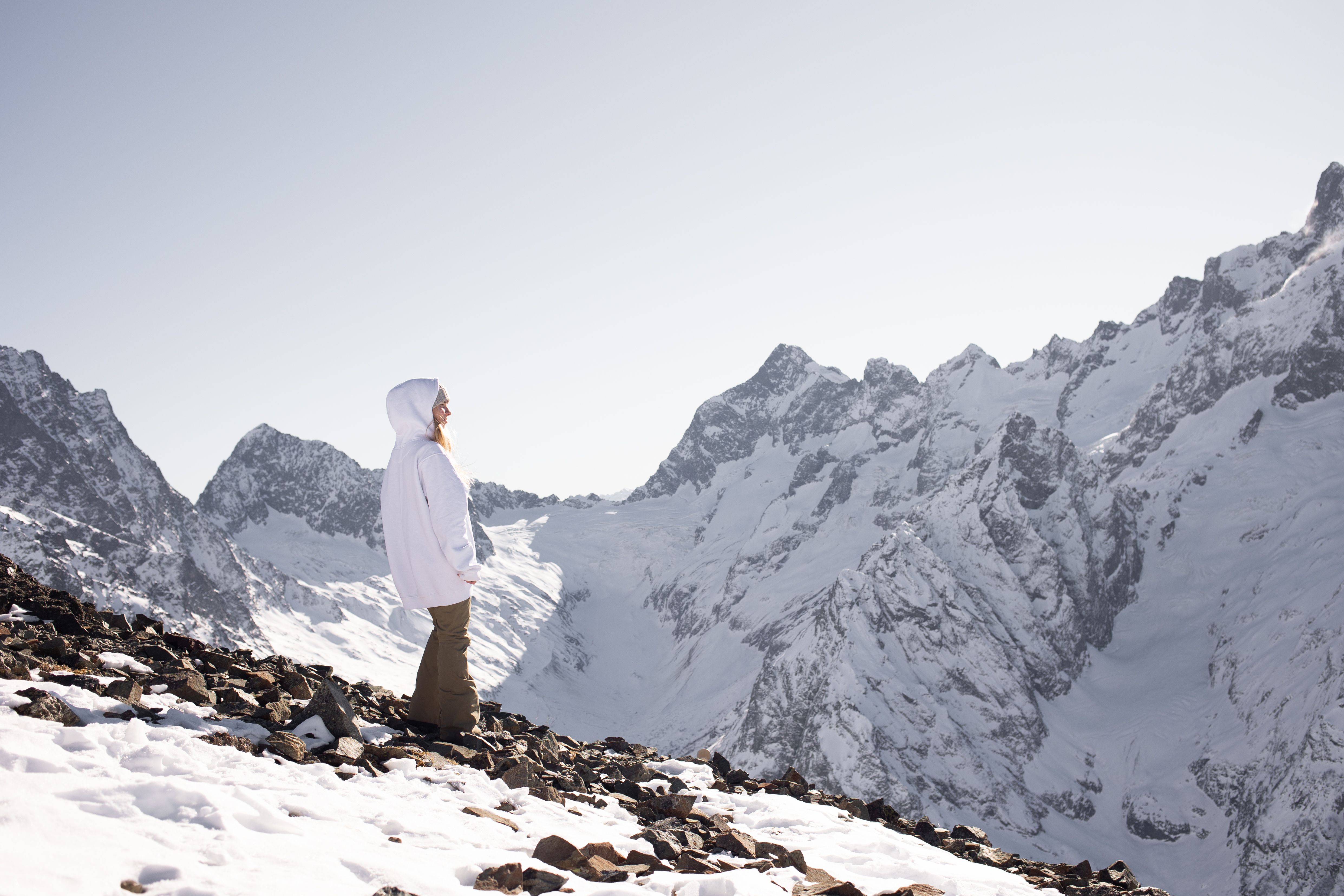 Two People on the Rock during Snow · Free Stock Photo