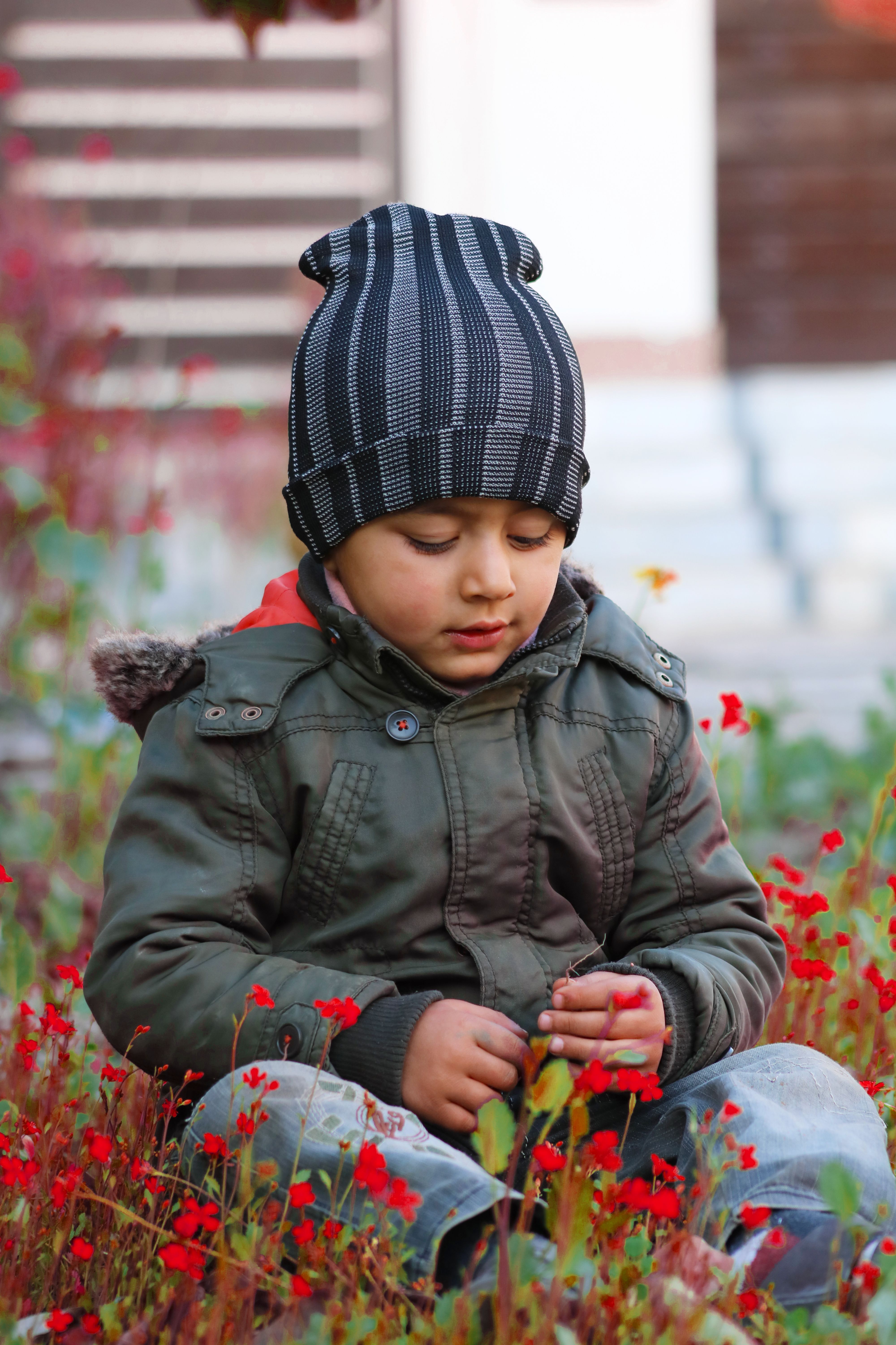 Boy Sitting on the Ground · Free Stock Photo