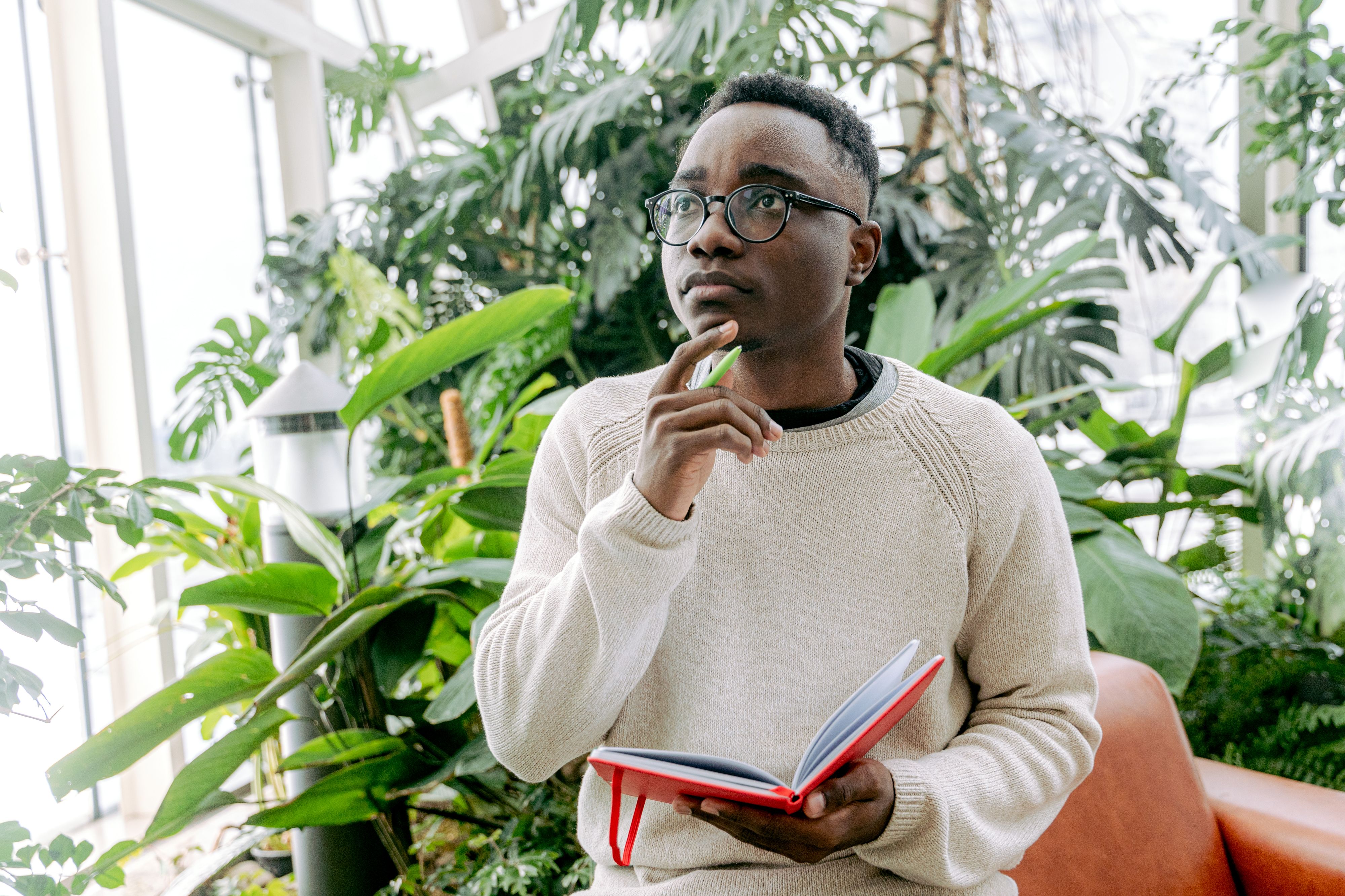 Man Wearing Eyeglasses Thinking · Free Stock Photo