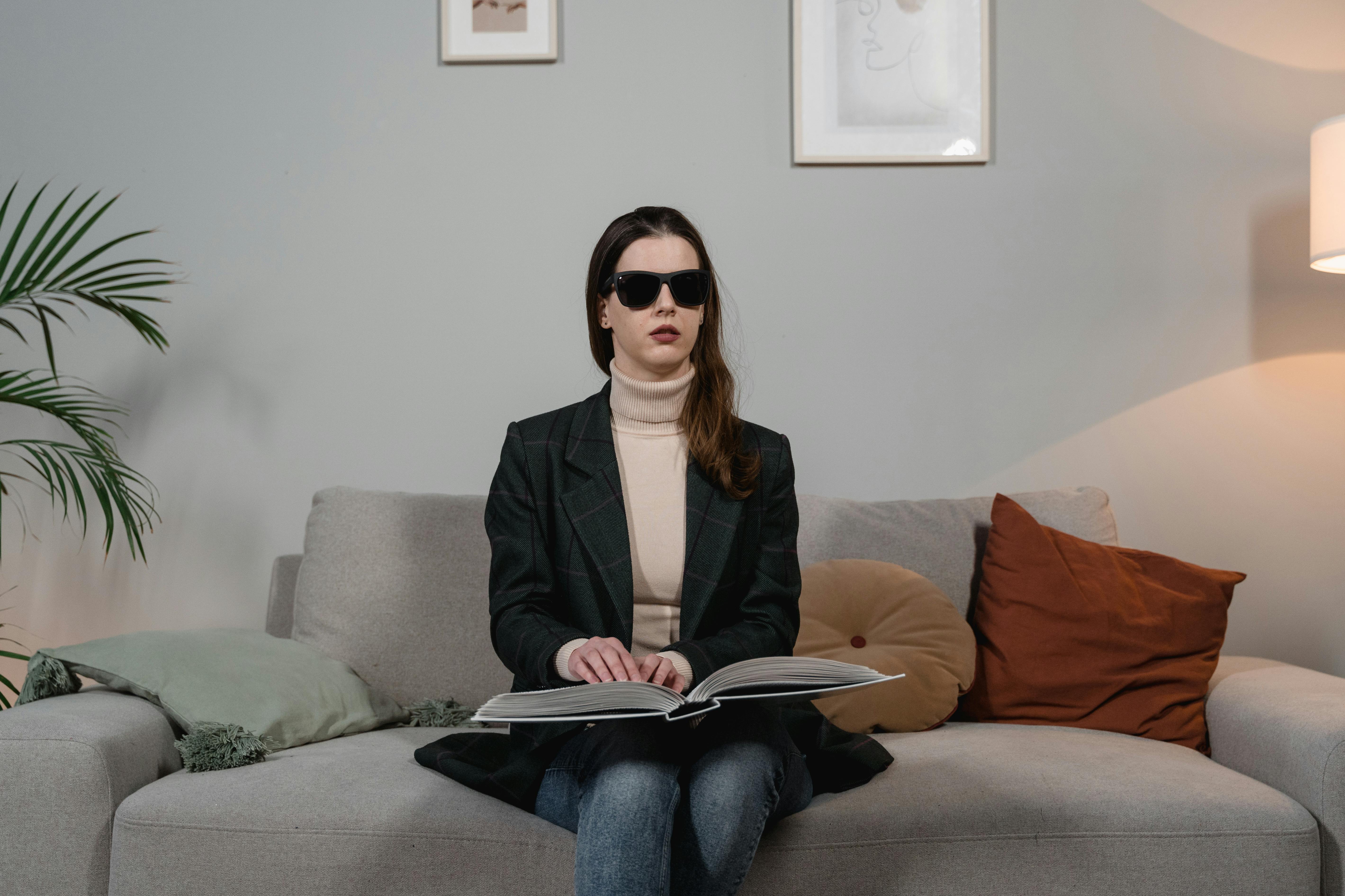 Woman in Black Blazer Reading by Braille Method · Free Stock Photo
