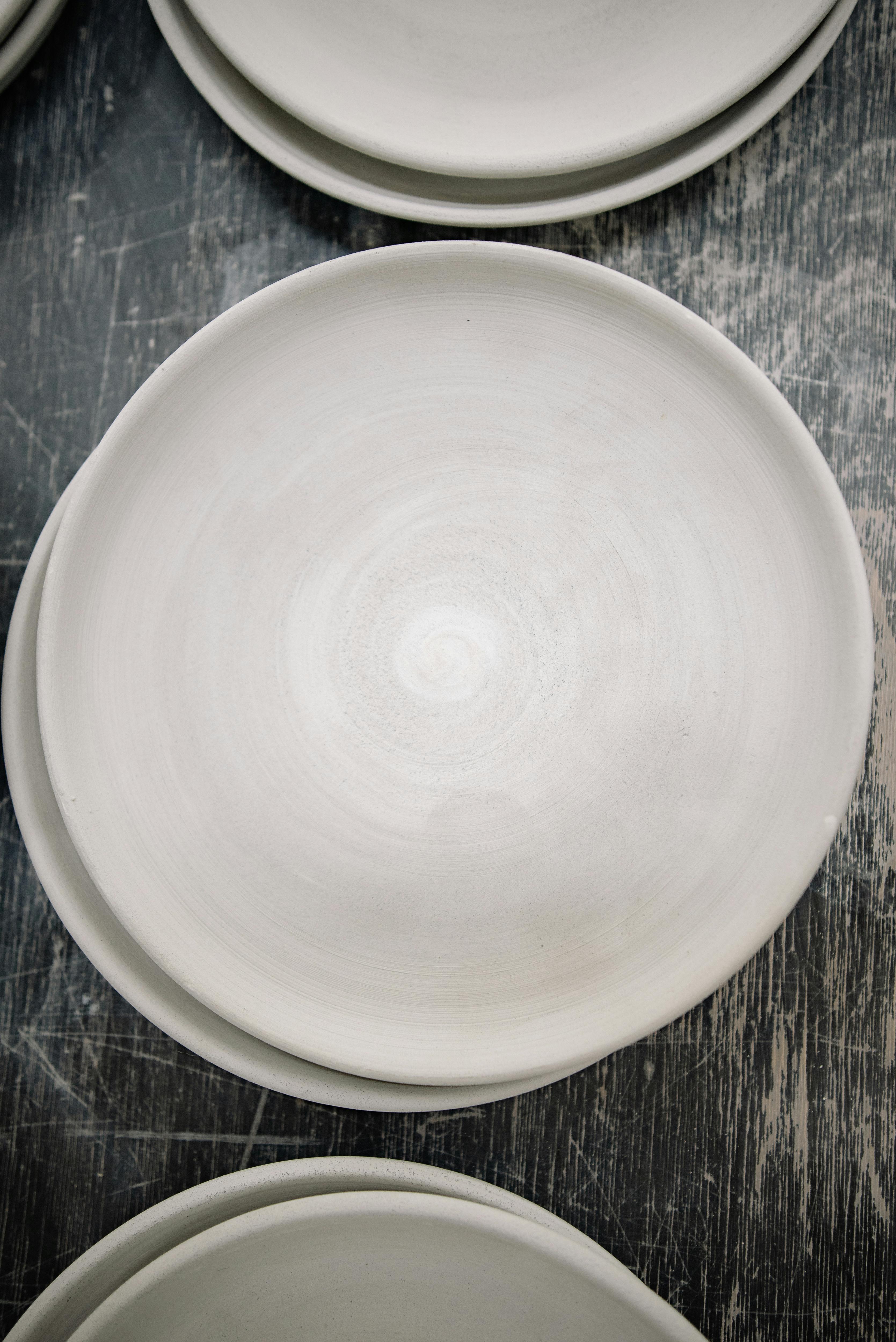 Flat Lay Shot of Empty Plates · Free Stock Photo