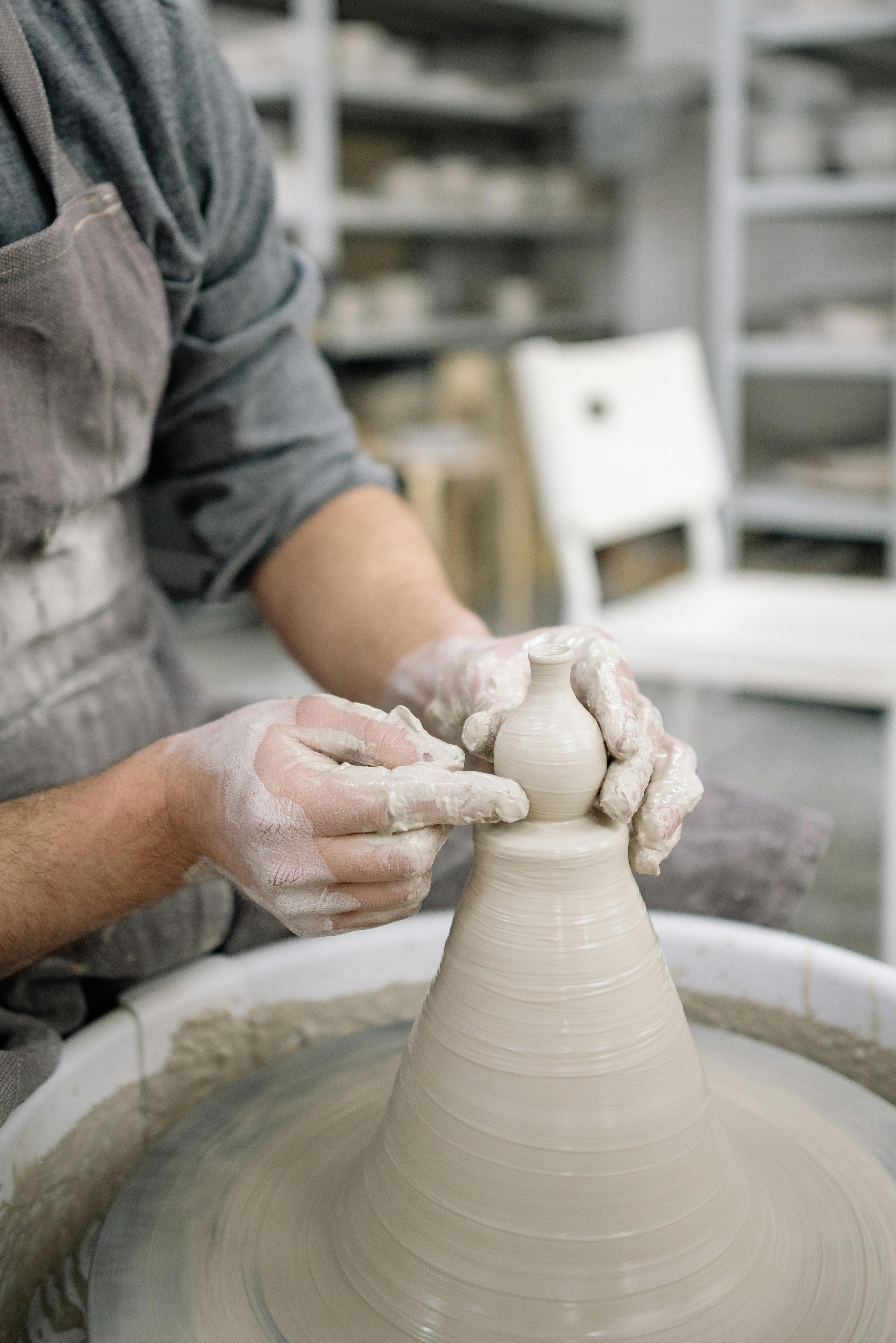 Hands of a Person Molding Clay · Free Stock Photo