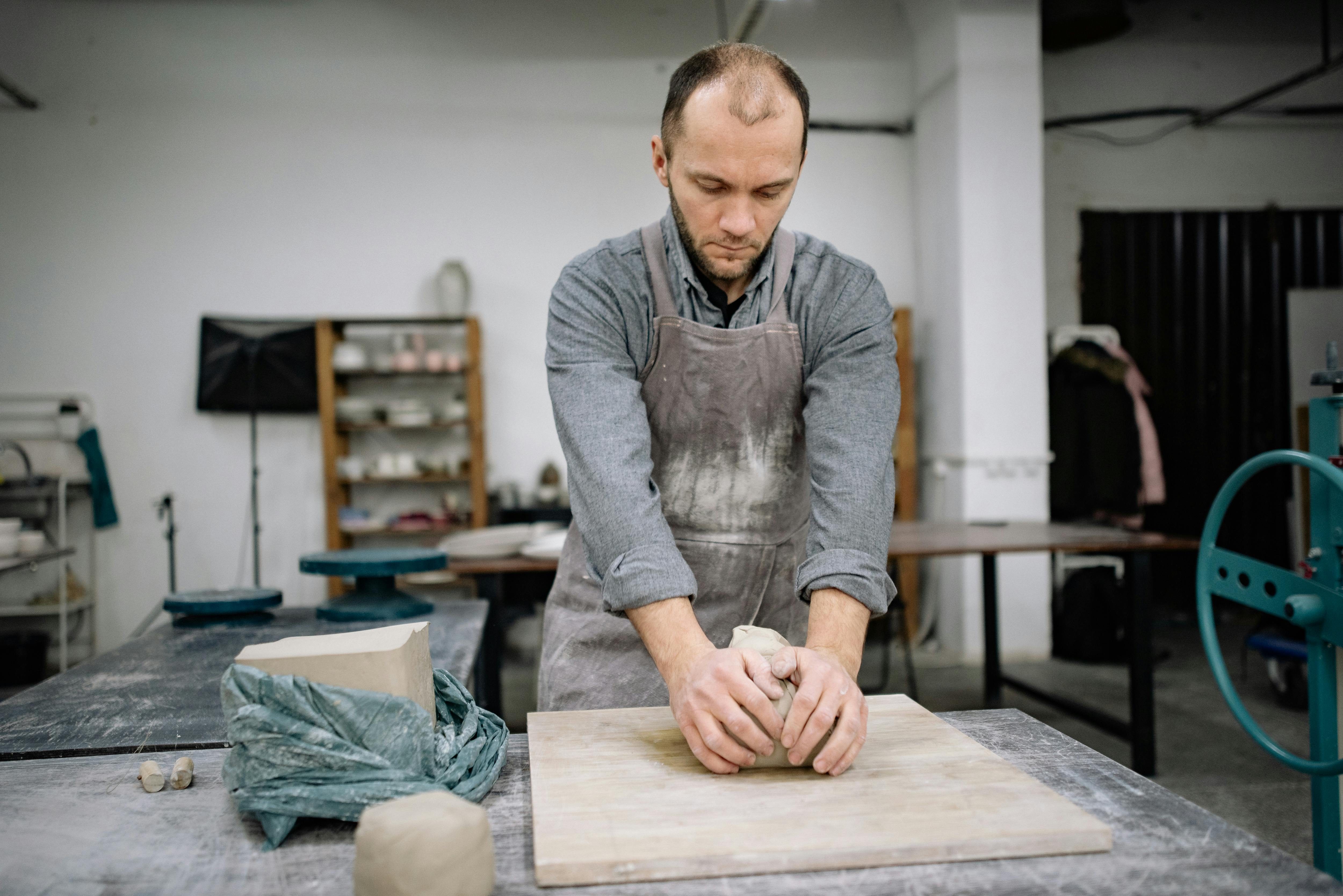 Man Working in Workshop · Free Stock Photo