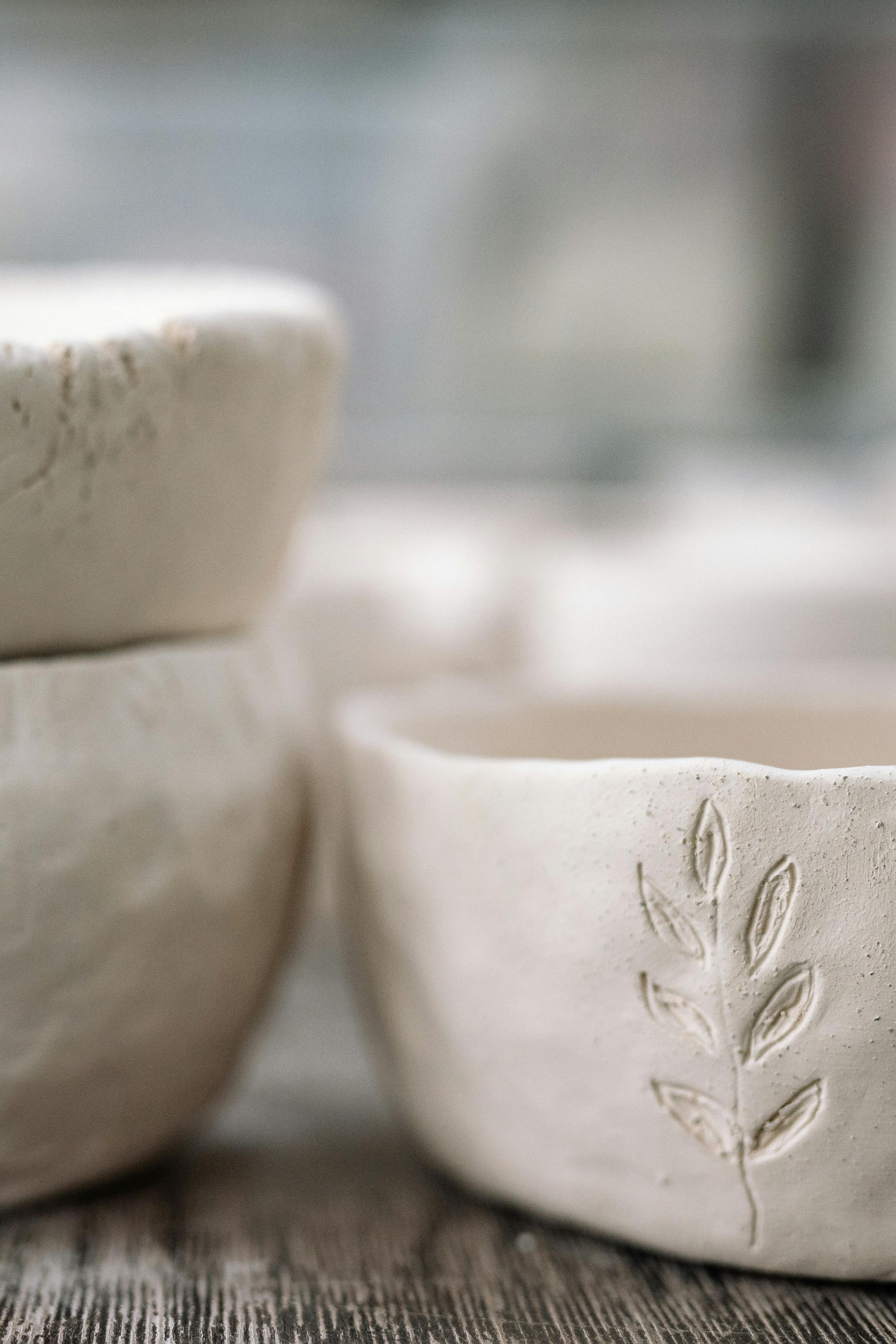 A Person Molding a Clay · Free Stock Photo