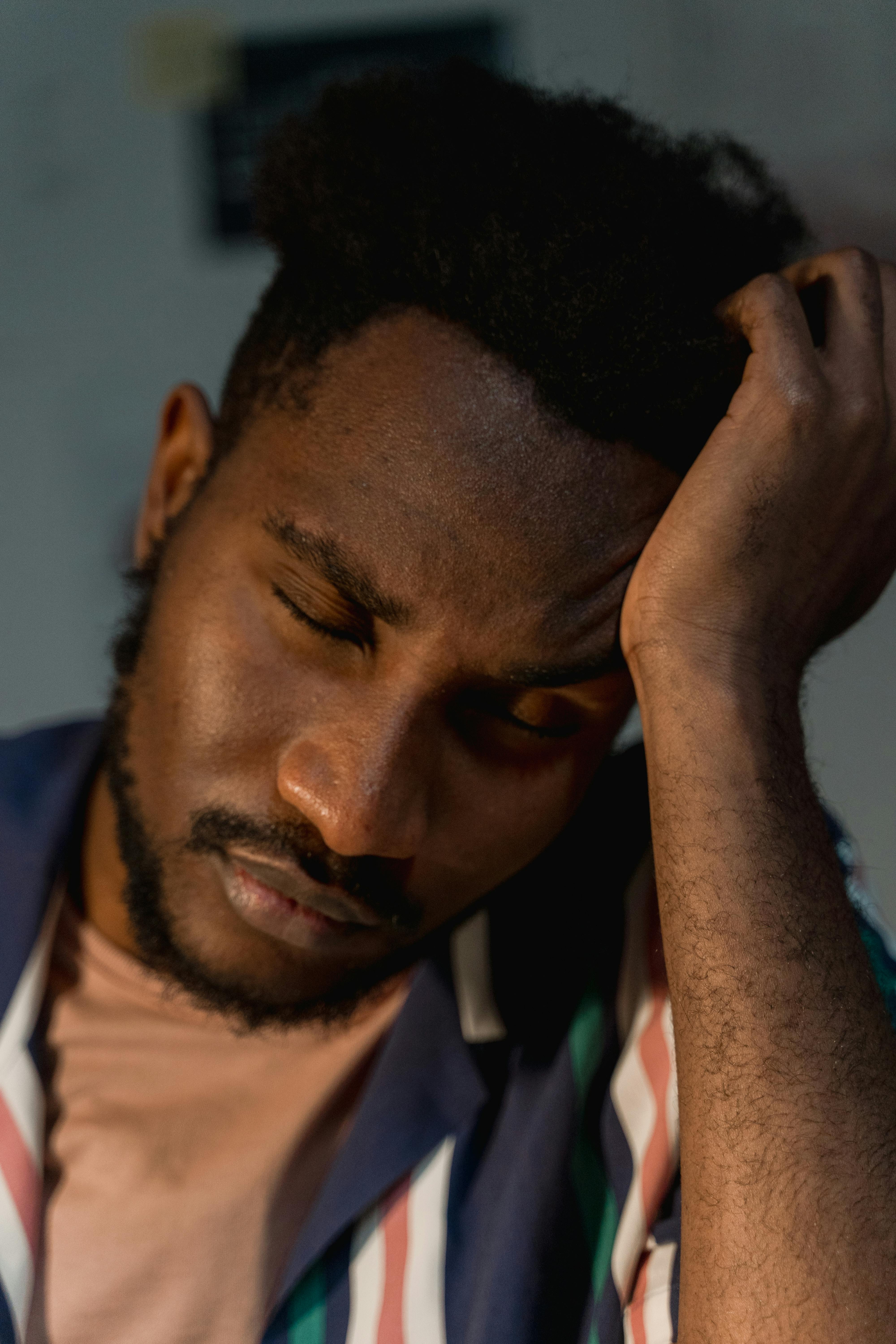 Close Up Photo of Man Sleeping with Hand on Head · Free Stock Photo