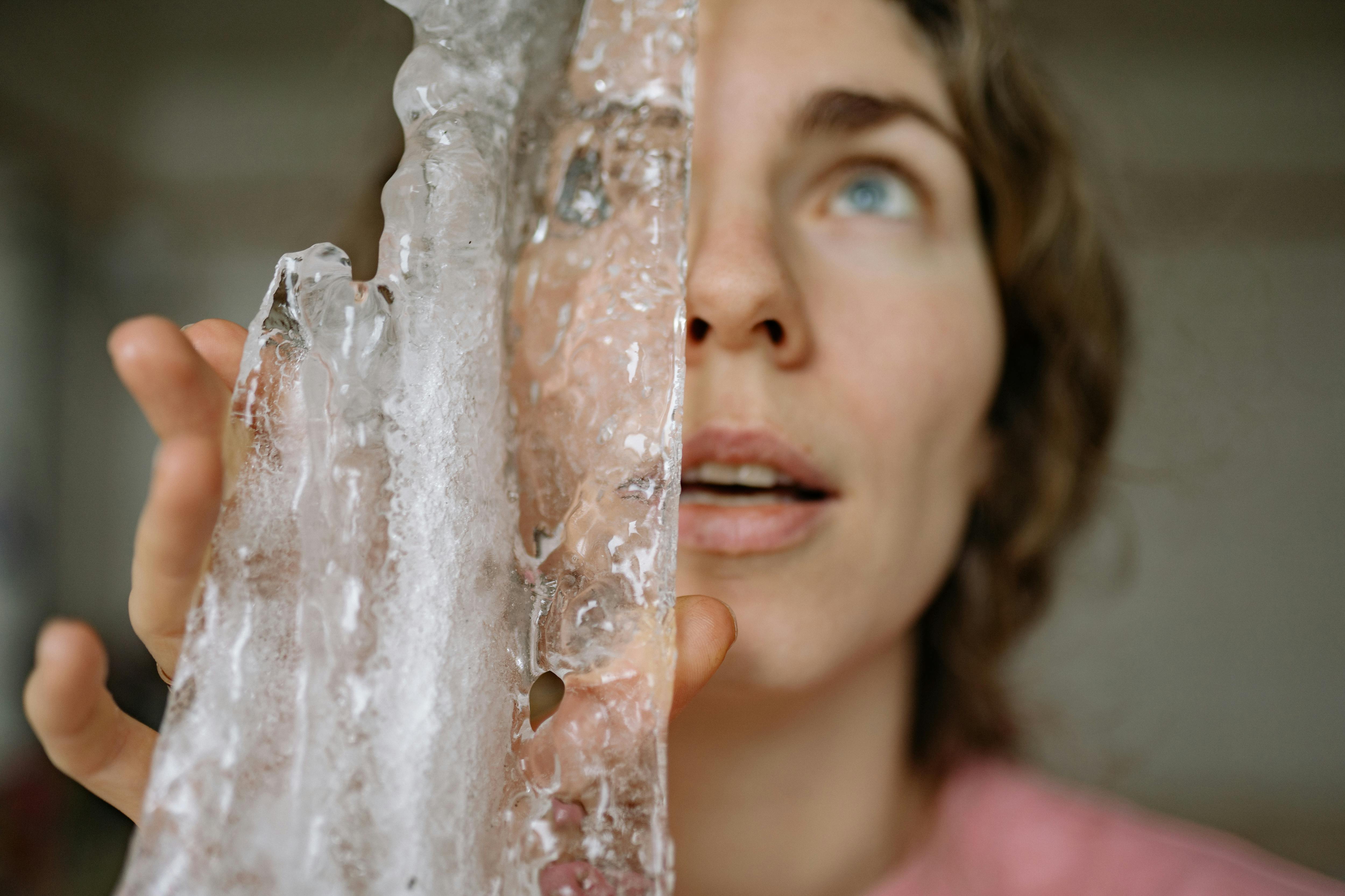 Woman with Icicle in Hands · Free Stock Photo