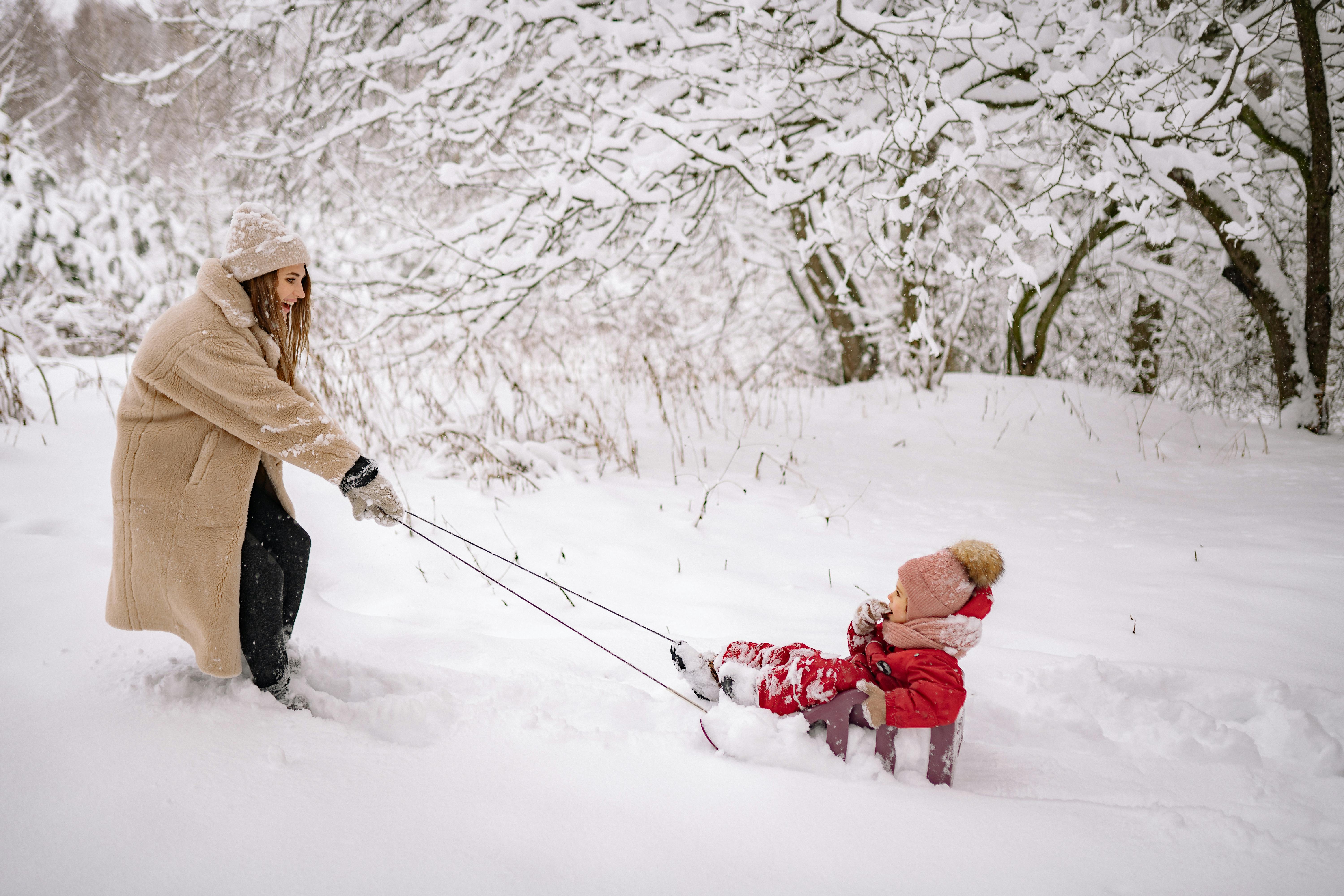 Person Playing With Snow · Free Stock Photo