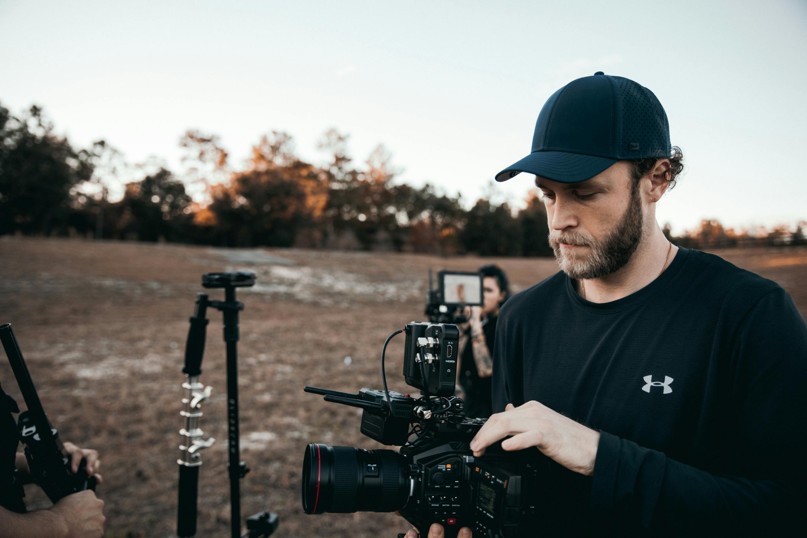 Person Filming the Wedding Using a Camera · Free Stock Photo