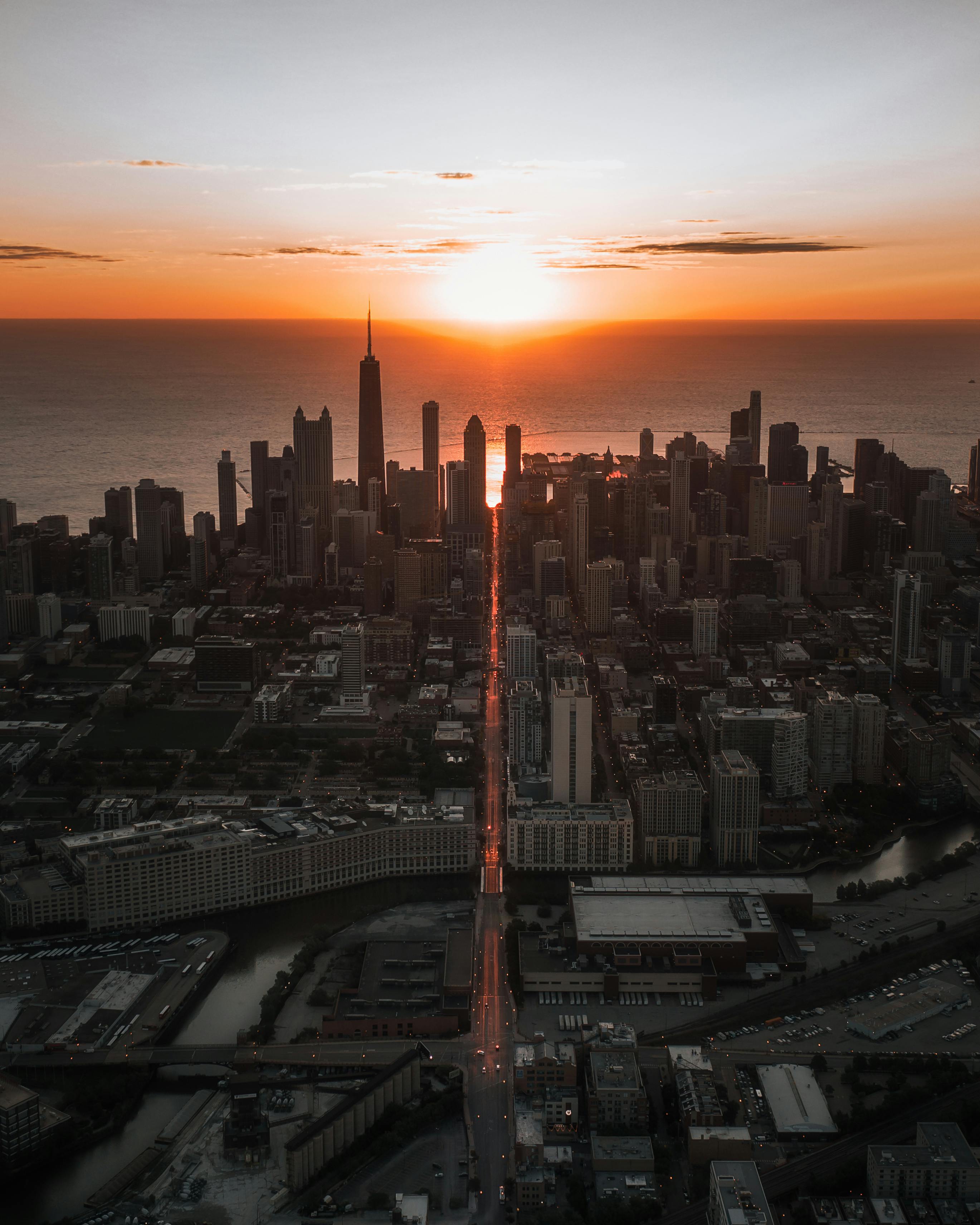 Drone Shot of a City during Sunset · Free Stock Photo