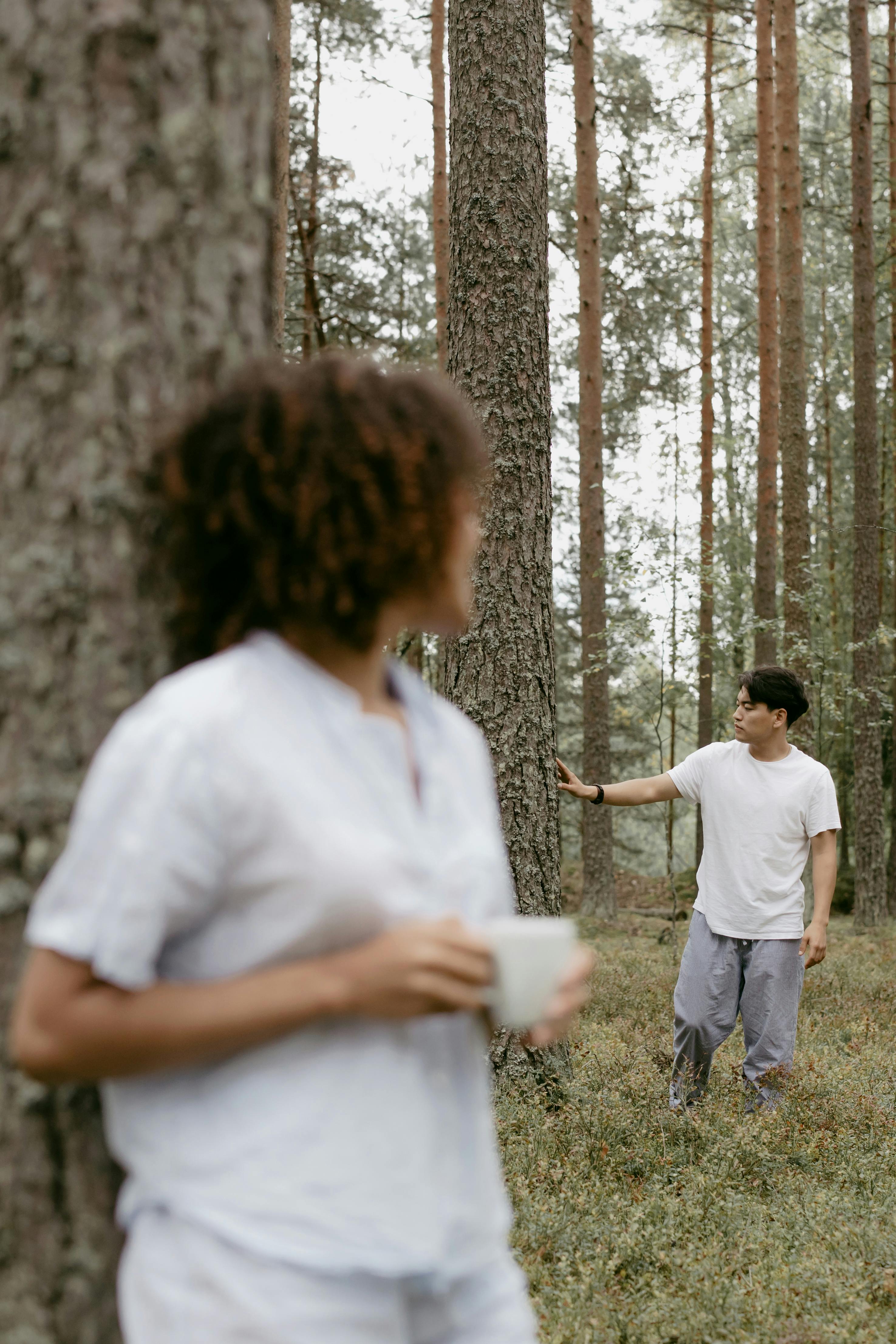 Couple Walking Among Trees · Free Stock Photo