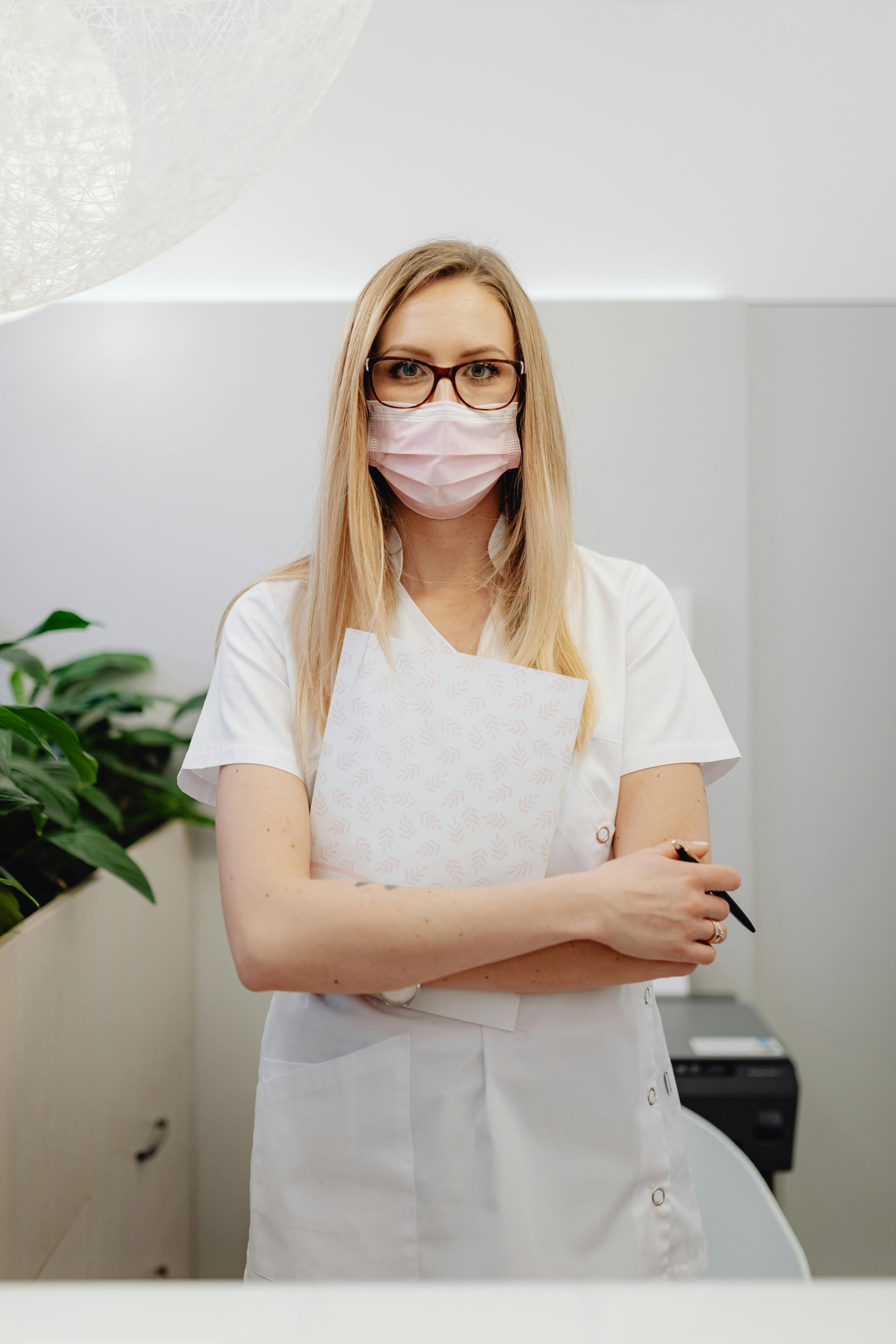 Woman in Medical Frontliner Uniform · Free Stock Photo