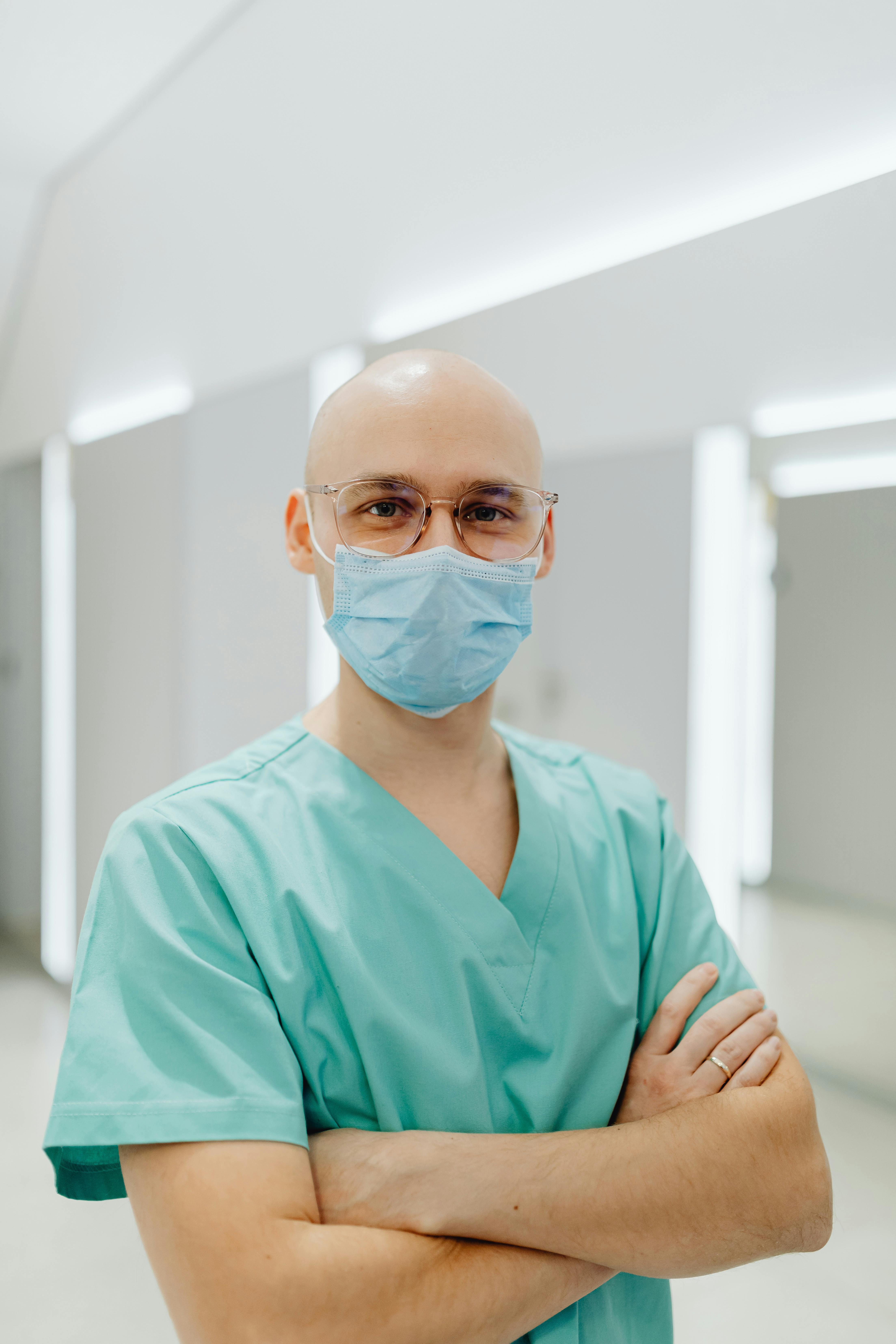 Person Doing Handcraft Face Mask · Free Stock Photo