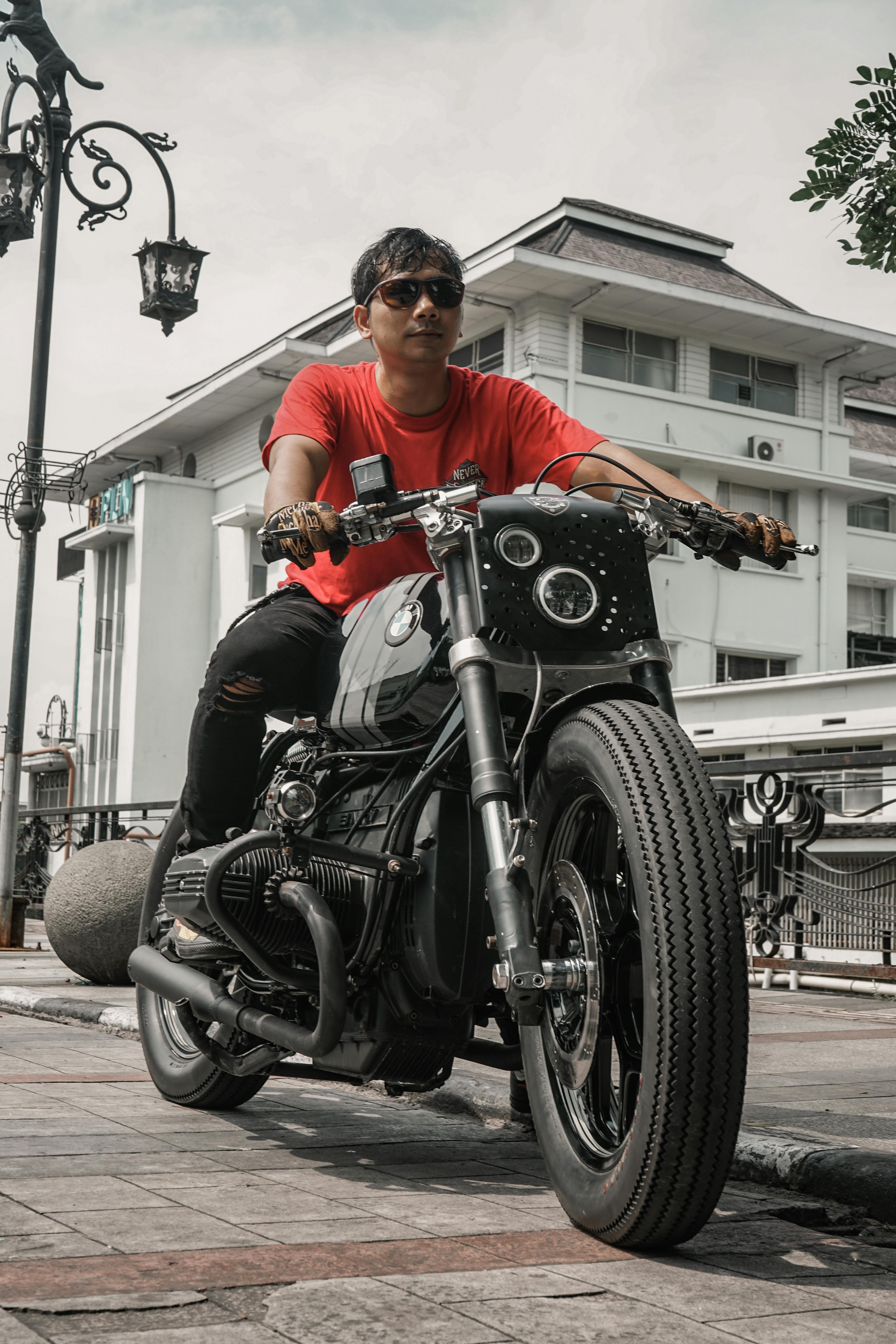 A Man Riding Red Motorbike · Free Stock Photo
