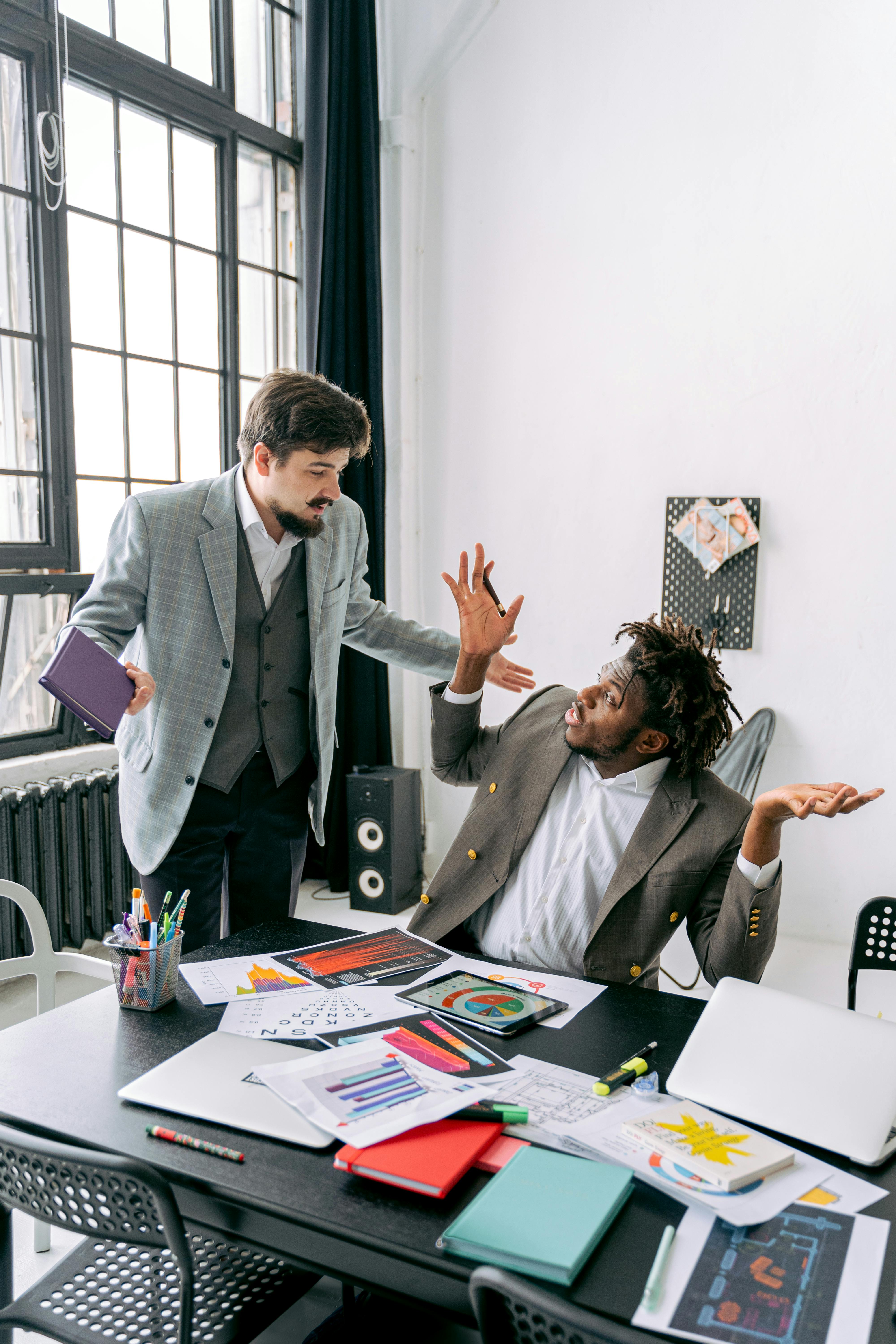 Two Man Disagreeing in an Office · Free Stock Photo