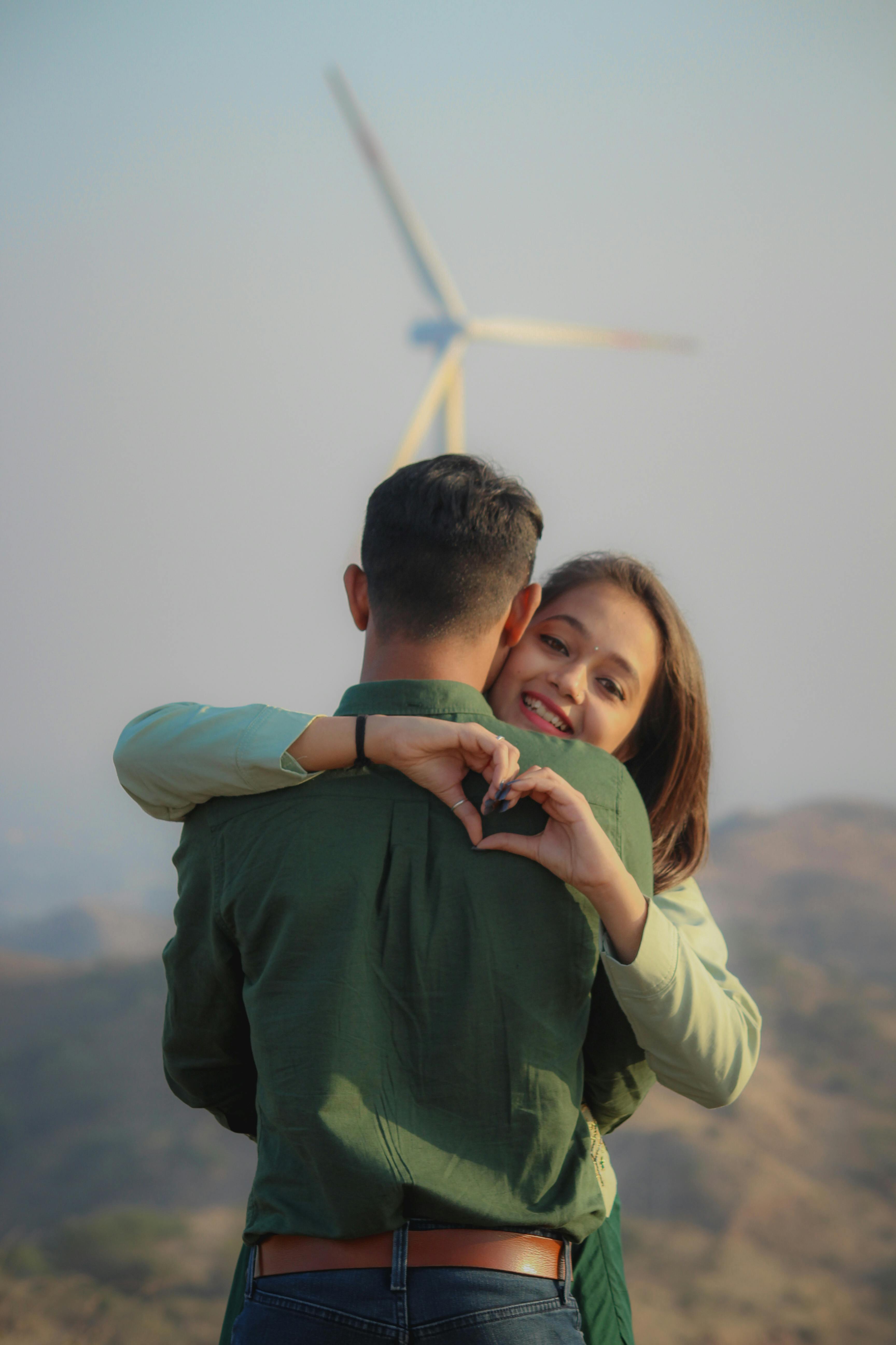 Young Couple Hugging · Free Stock Photo