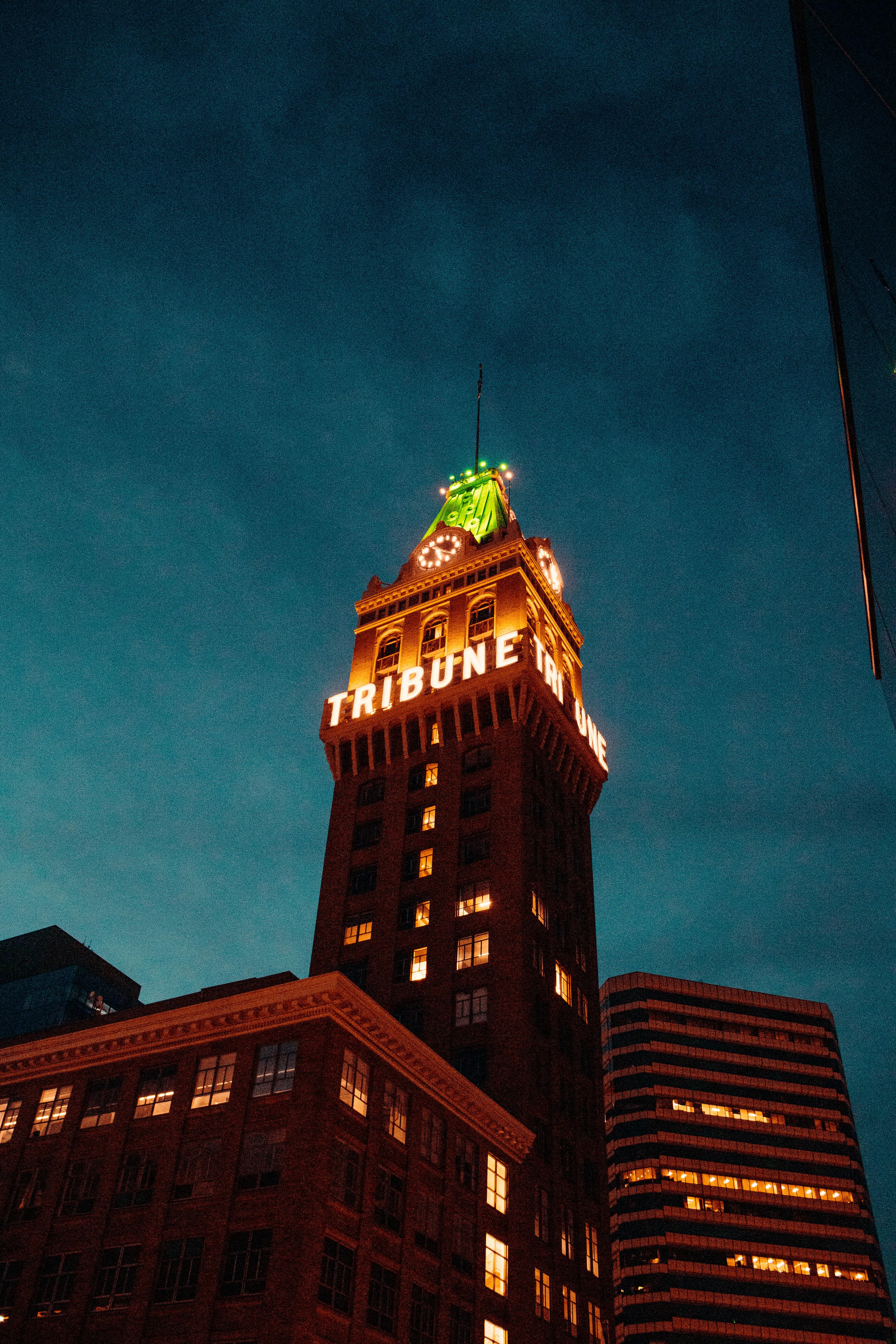 Low Angle View of an Illuminated Tower against Sky at Dusk · Free Stock ...